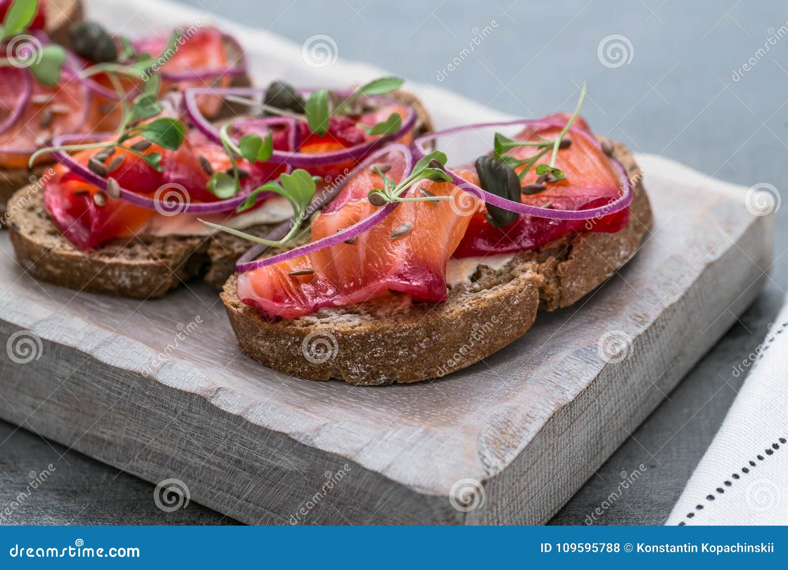 Fish Tapas on Crusty Bread, Bread and Cured Salmon Stock Photo - Image ...