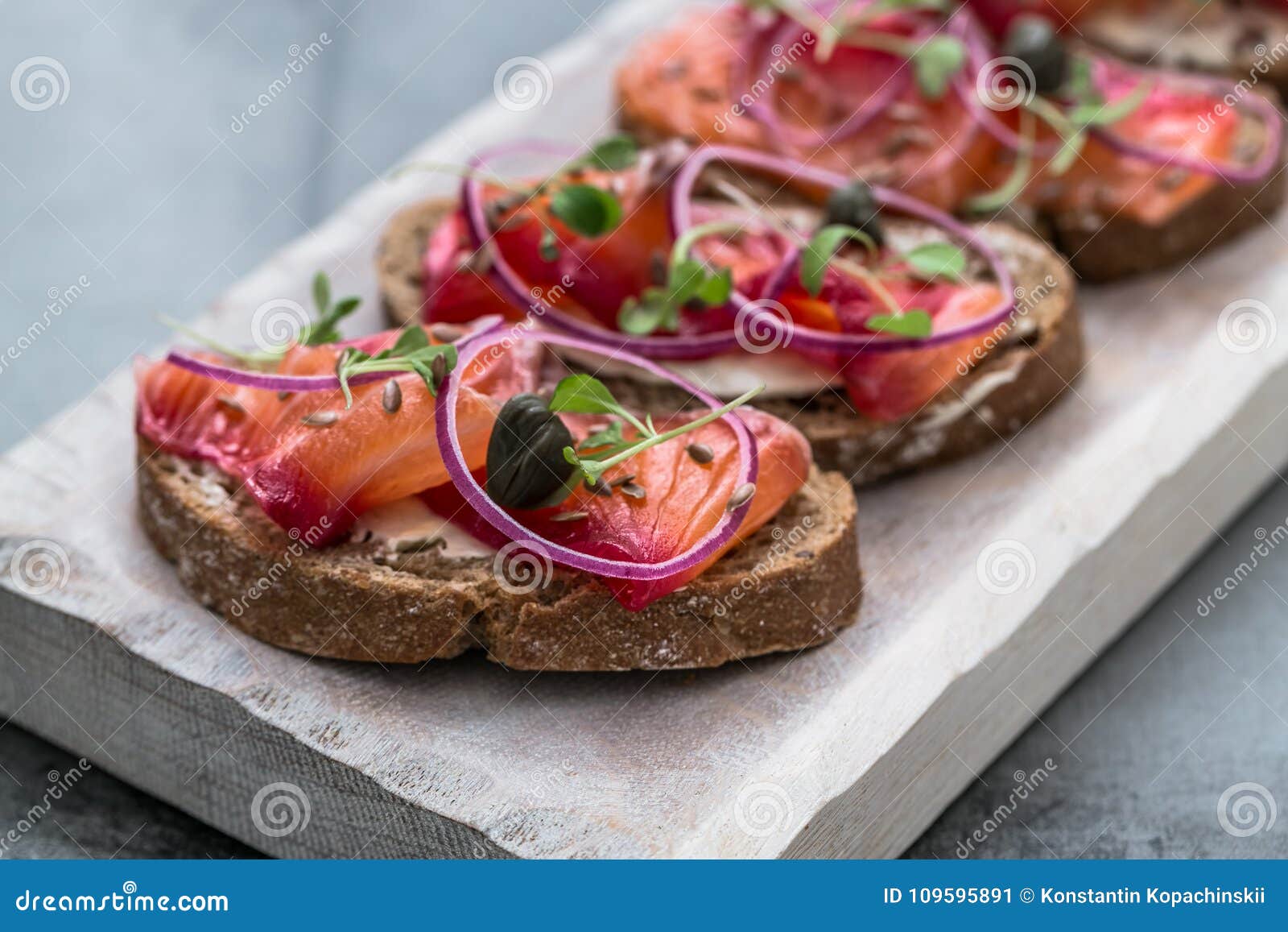 Fish Tapas on Crusty Bread, Bread and Cured Salmon Stock Image - Image ...