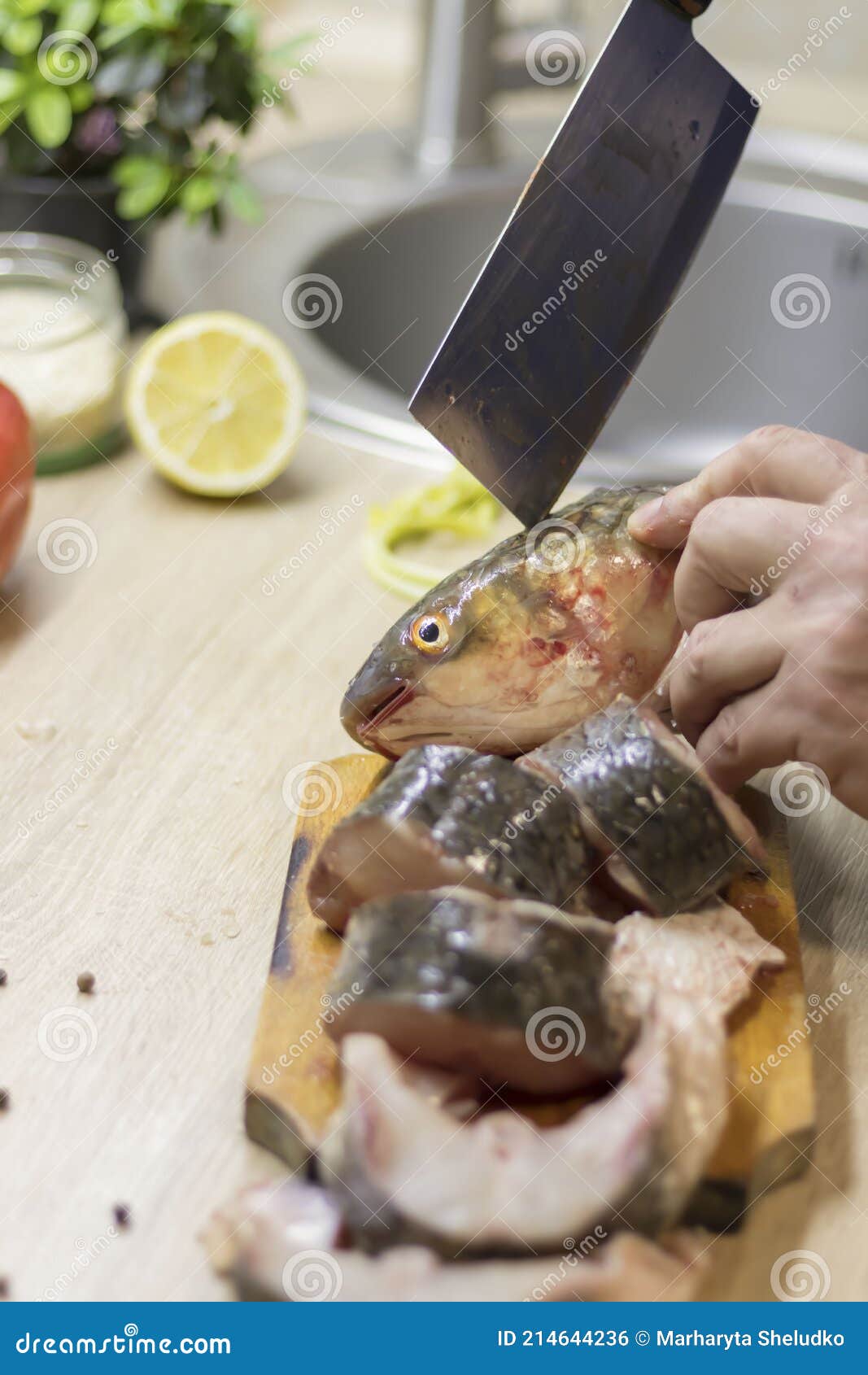 Fish. There is a Raw Fish Cut into Pieces on the Kitchen Board Stock ...