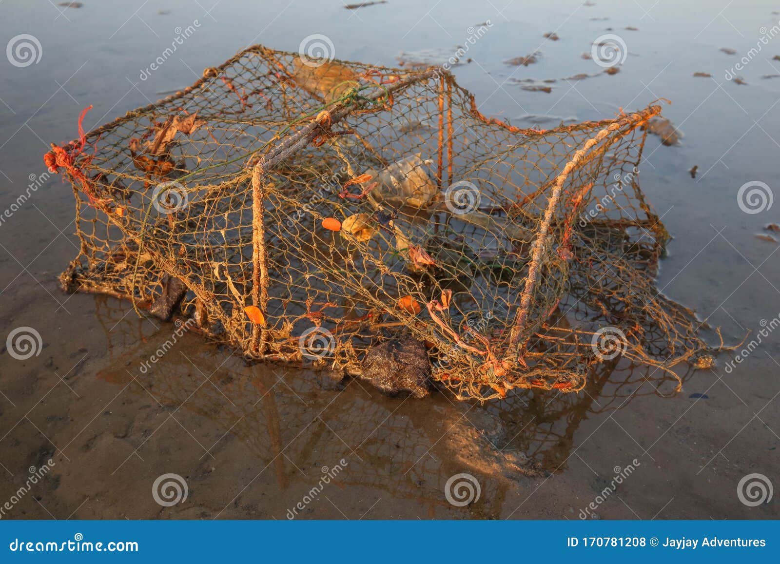 Fish Traps Placed on the Beach at Low Tide in Sunset Time Stock Photo ...