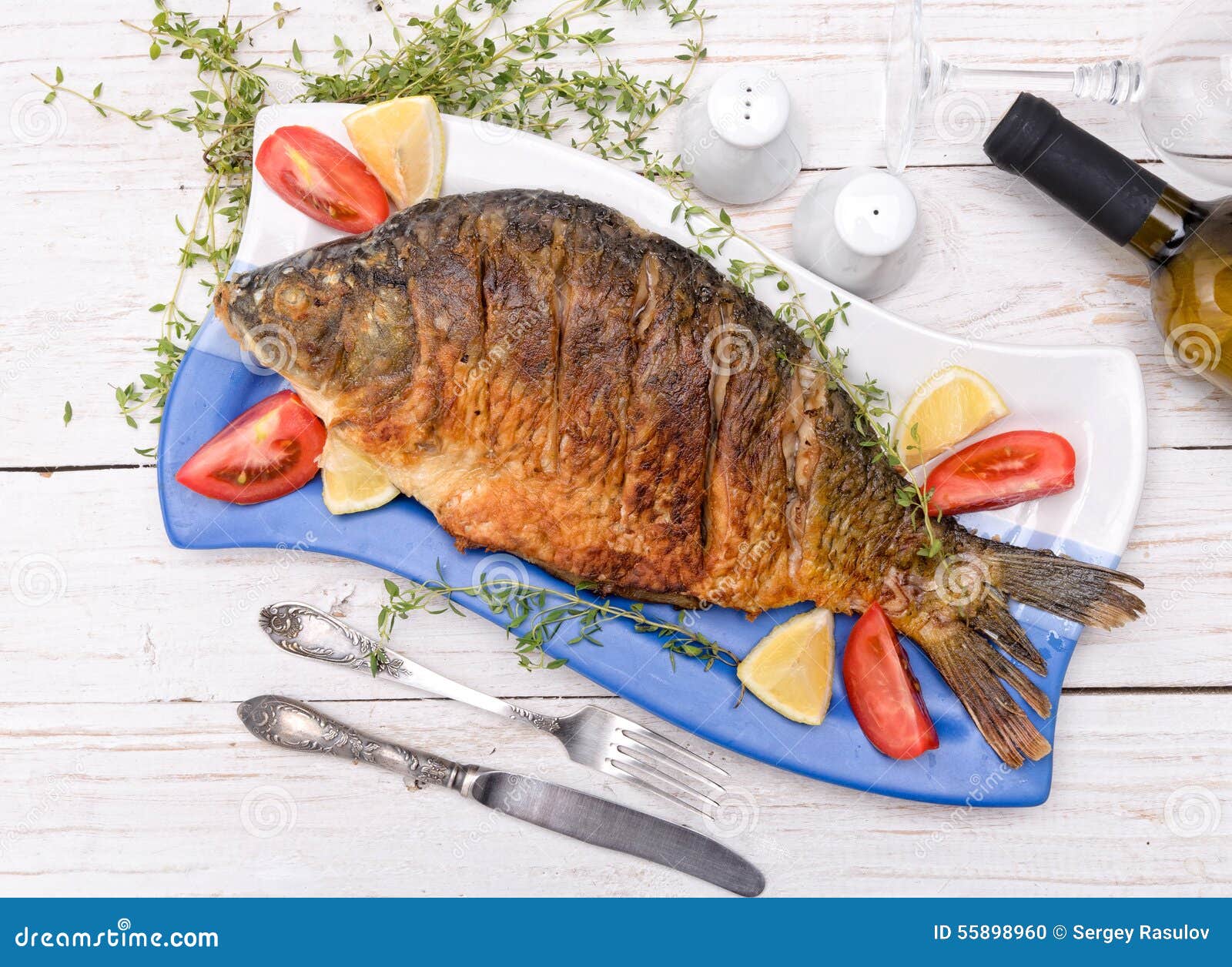 Fish on a White Wooden Table. Stock Photo - Image of lunch, plate: 55898960