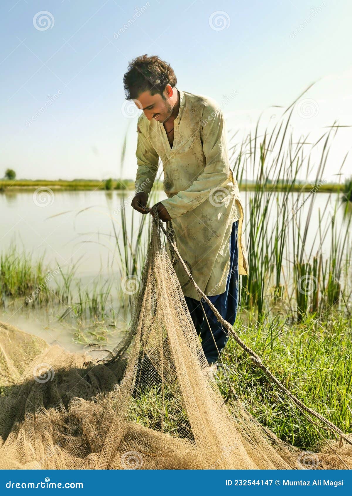 Fisher Men are Catching Fish by New Stock Image - Image of beach ...
