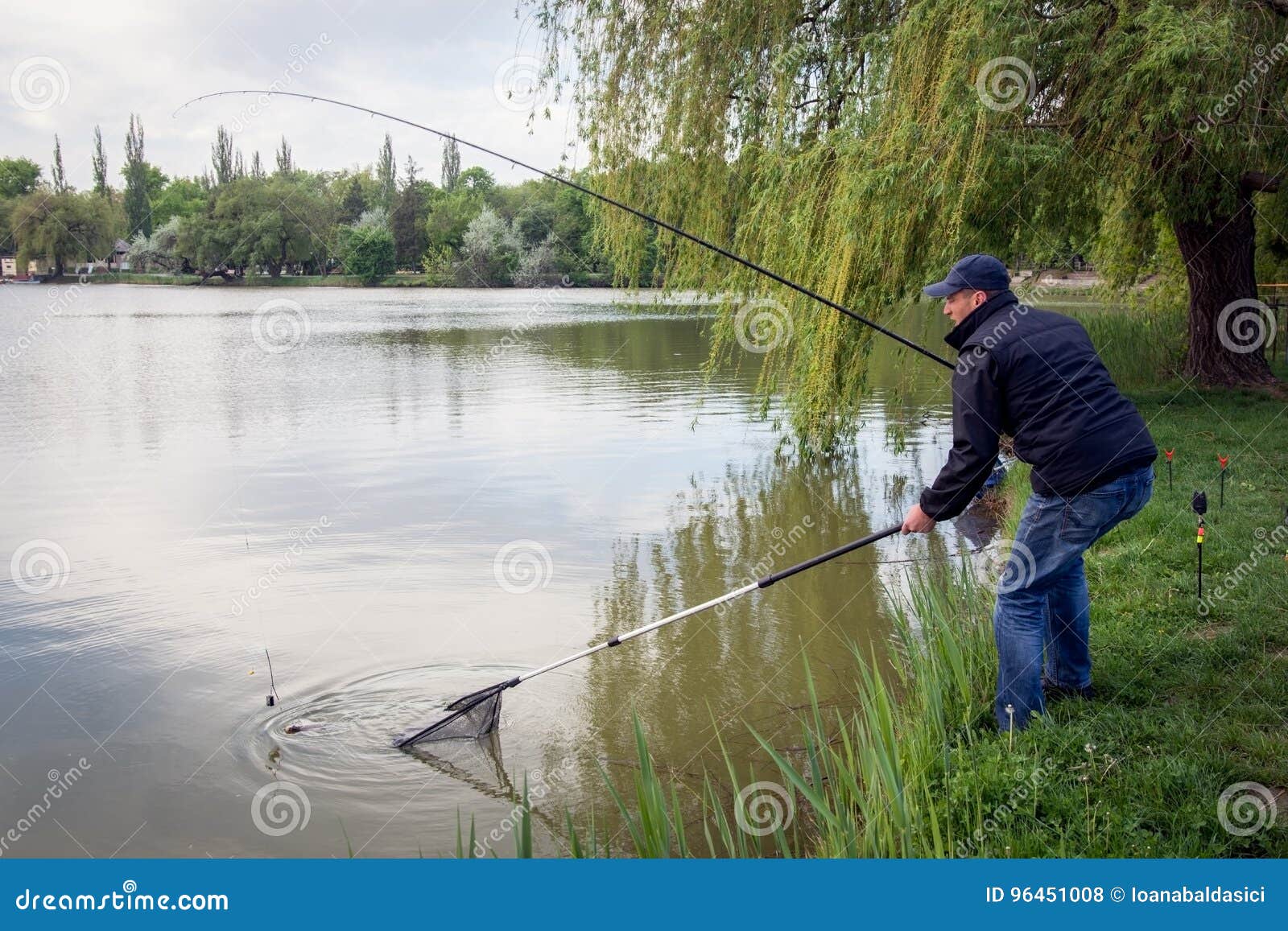 Fisherman in action stock photo. Image of nature, bulrush - 96451008