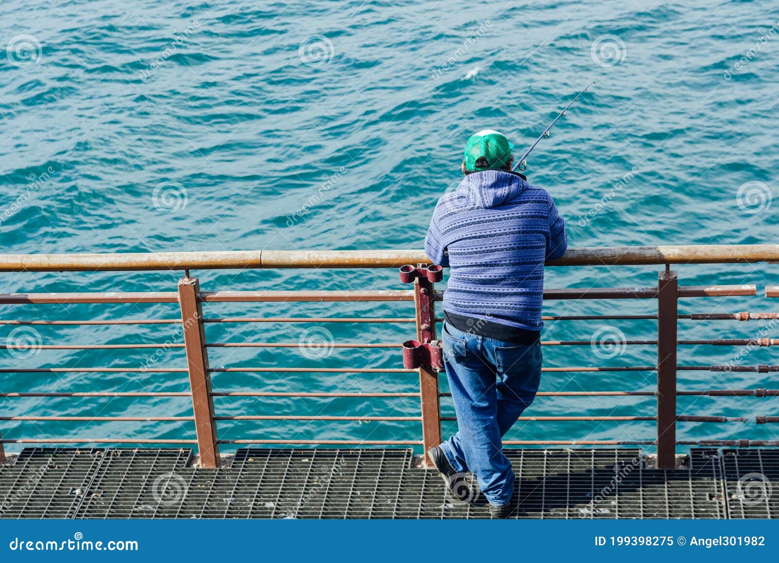View of a Fisherman from the Back Fishing Stock Image - Image of adult ...