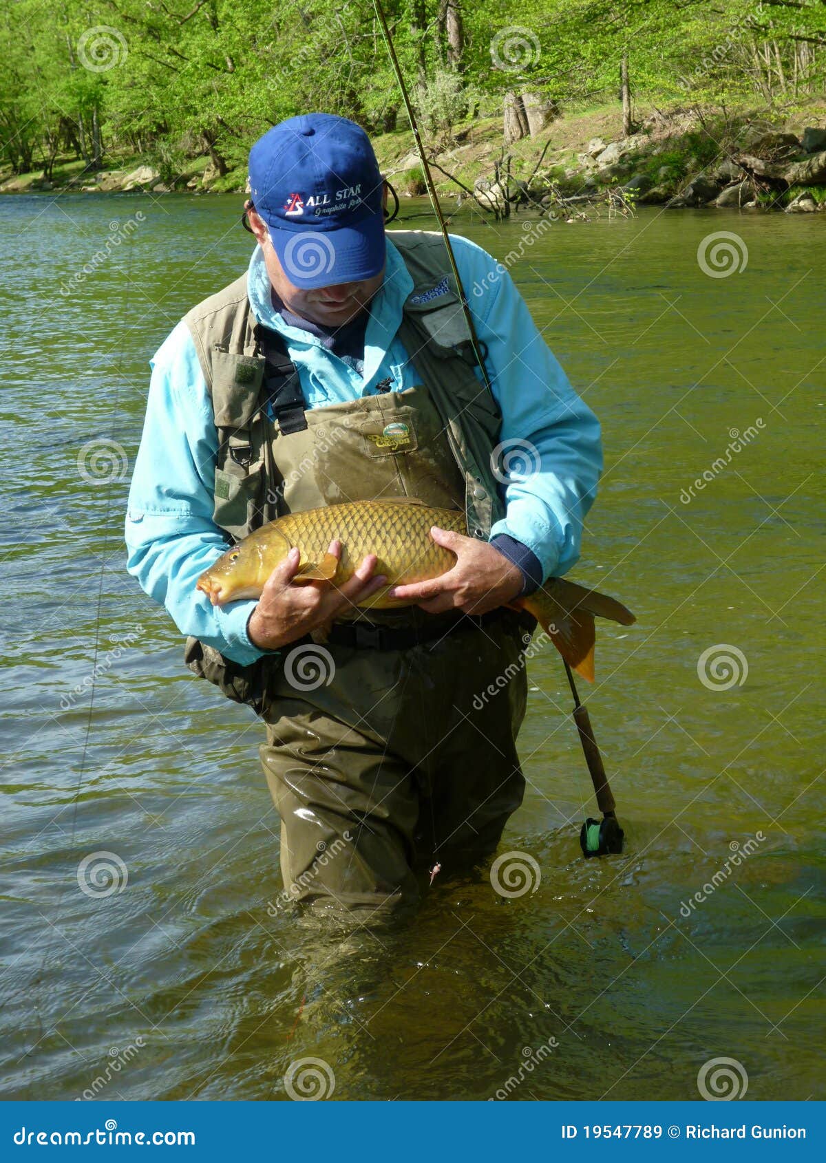 Fisherman with Big Carp editorial stock image. Image of maryland - 19547789