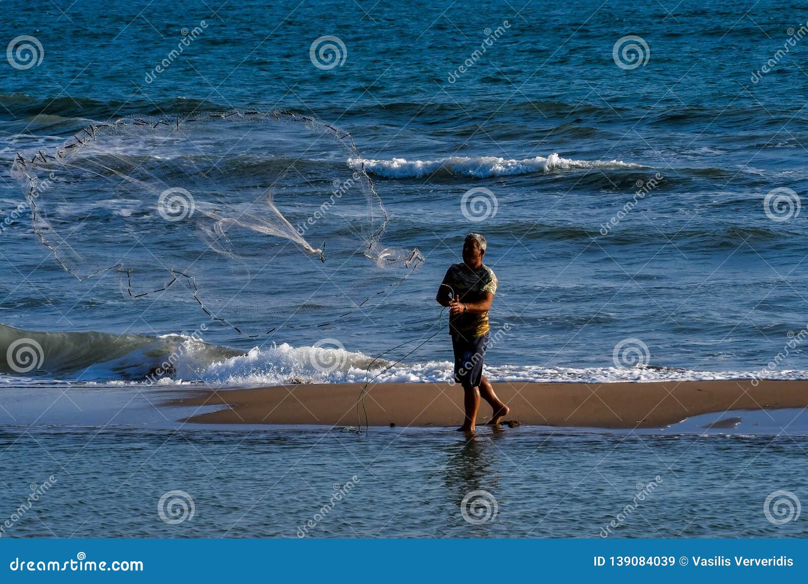Fisherman Casting Net during Daylight in Delta of the River Alpheios in ...