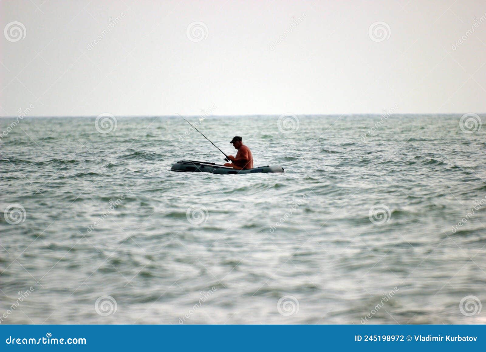 Fisherman Catches Fish in the Sea on a Boat Stock Photo - Image of wave ...
