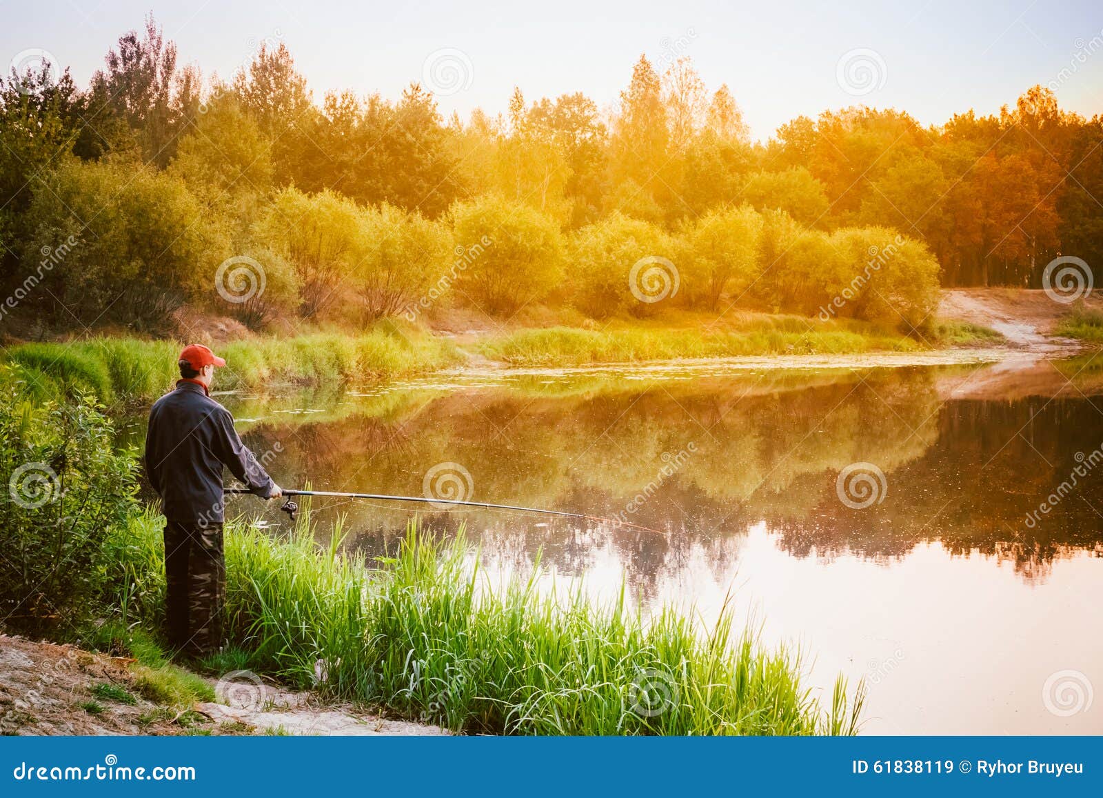 Fisherman Catches of Fish on River Stock Image - Image of nature, sport ...