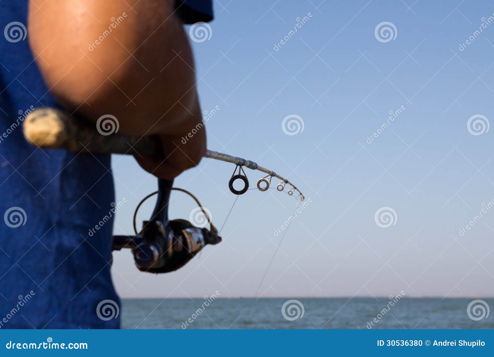 Fisherman catches a fish stock photo. Image of nature - 30536380