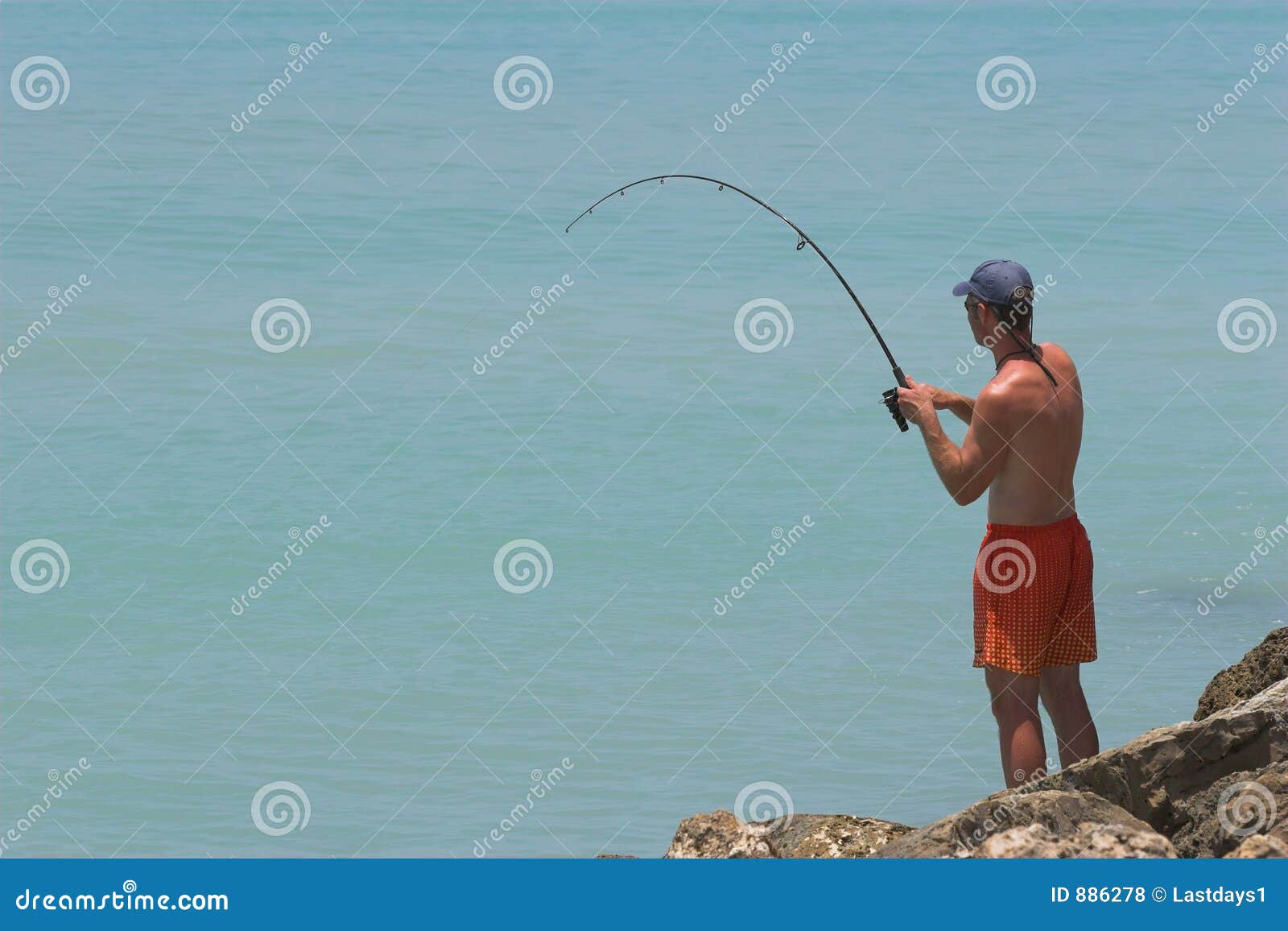 Fisherman catching fish stock photo. Image of fisherman - 886278 Fisherman catching fish stock photo. Image of fisherman - 886278