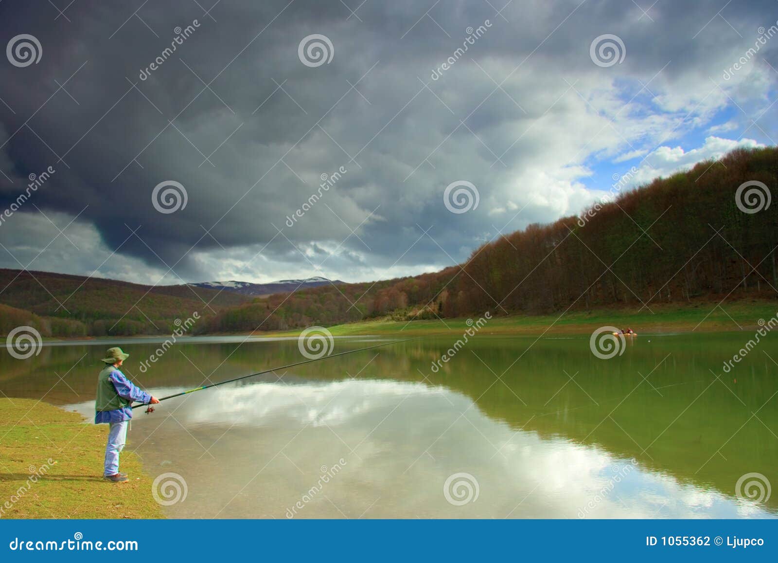 Fisherman Catching Fish on a Lake Stock Photo - Image of outside, fish ...