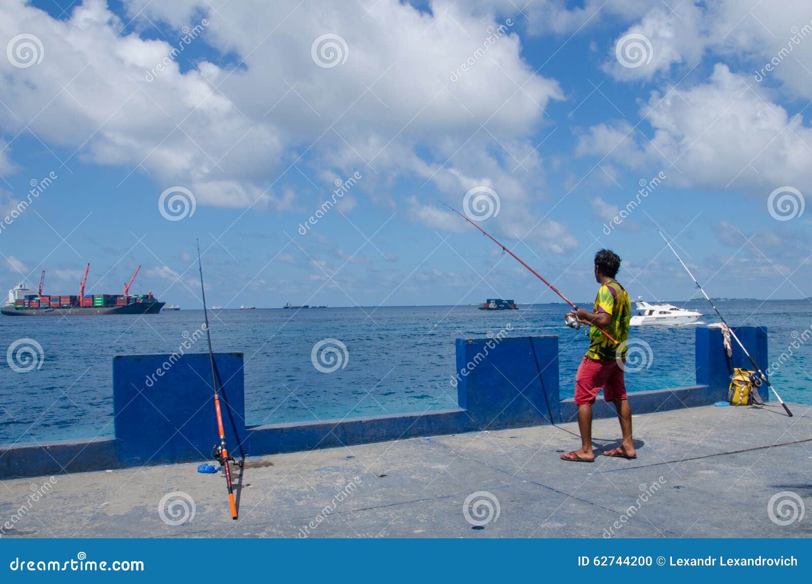 Fisherman Catching Fish Using Three Rods Editorial Image - Image of ...