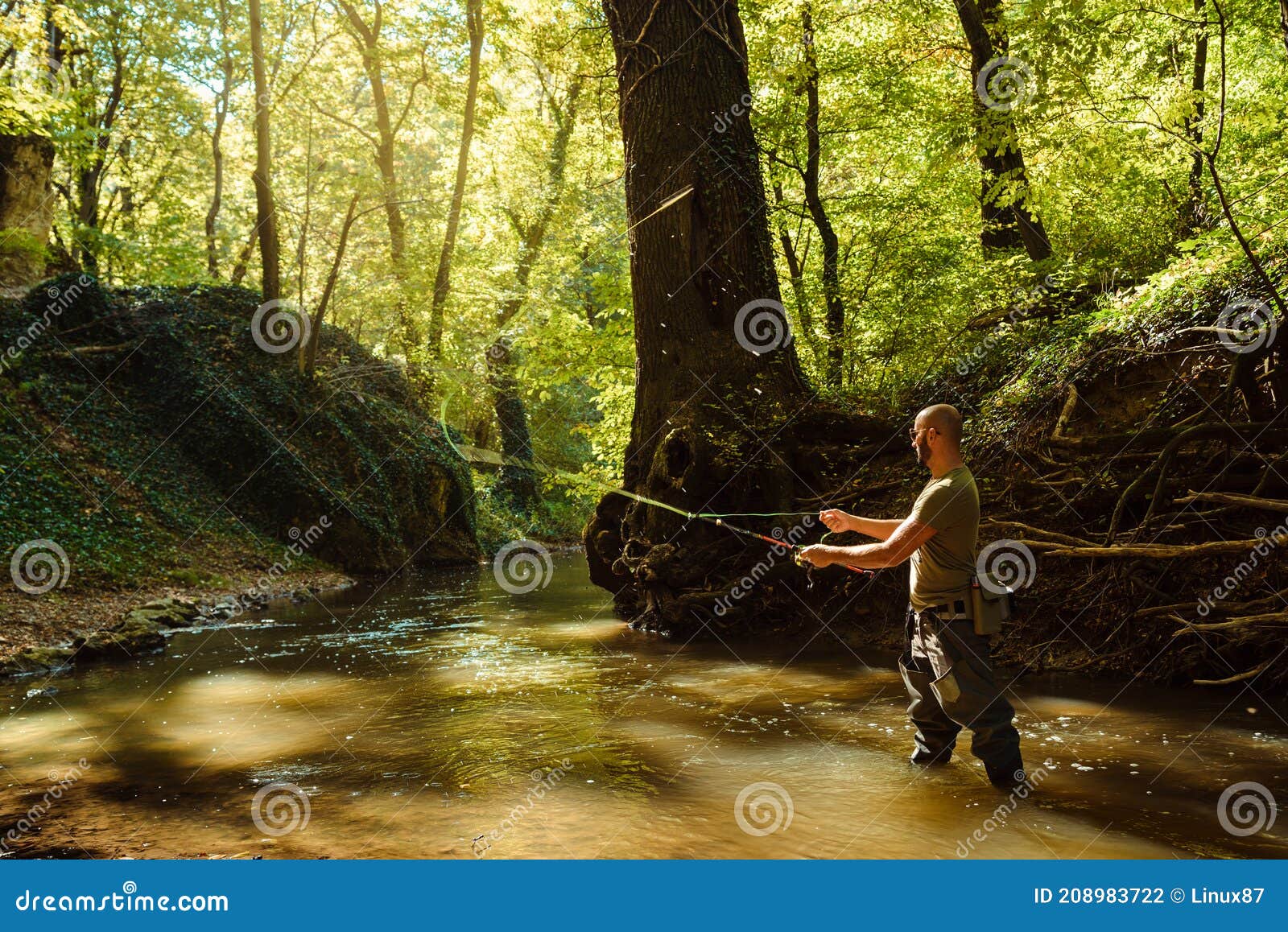 A Fisherman Fishing with Fly Fishing Stock Photo - Image of brook ...