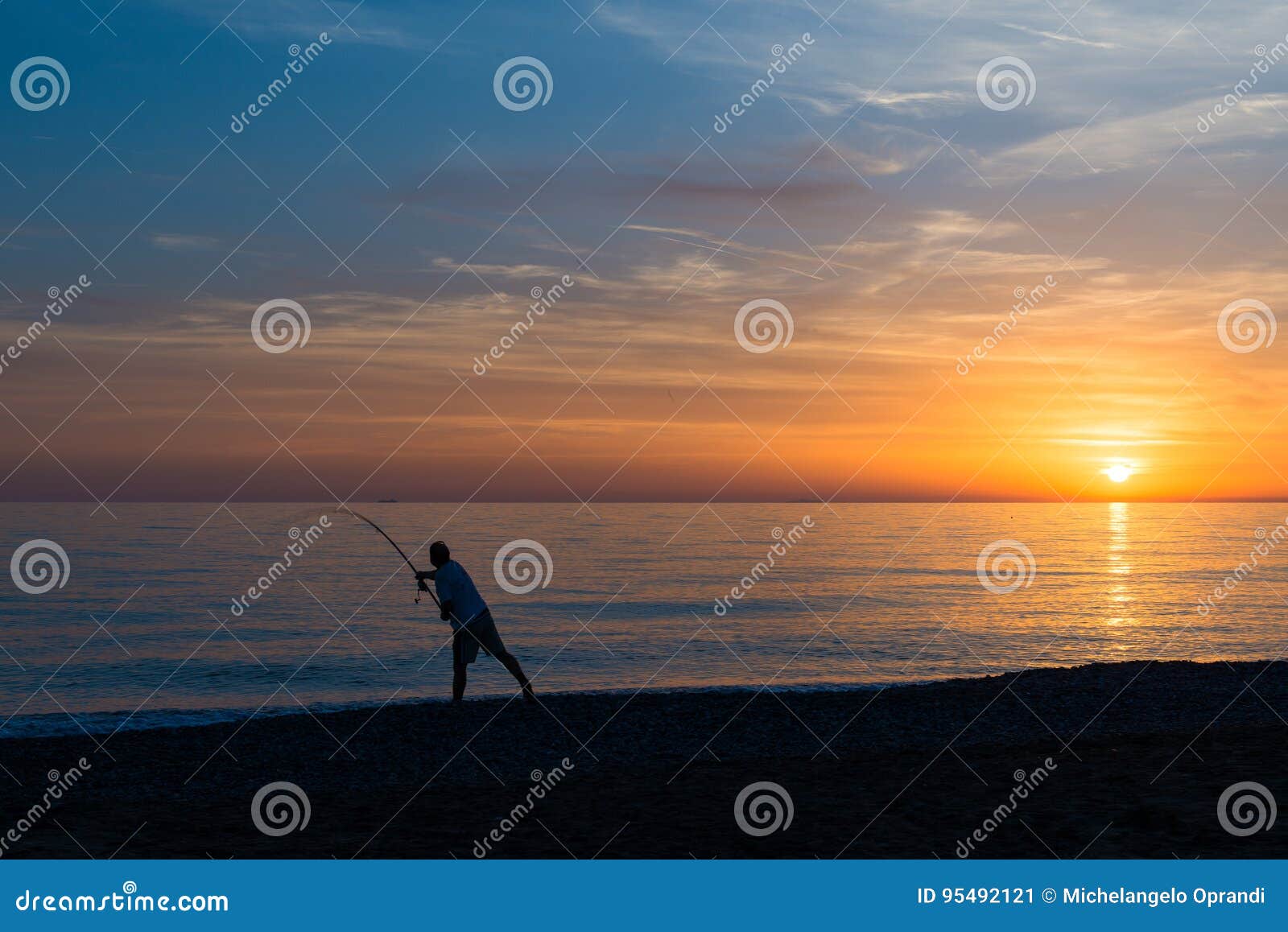 Fisherman with Fishing Rod Makes the Launch in the Sea Stock Image ...