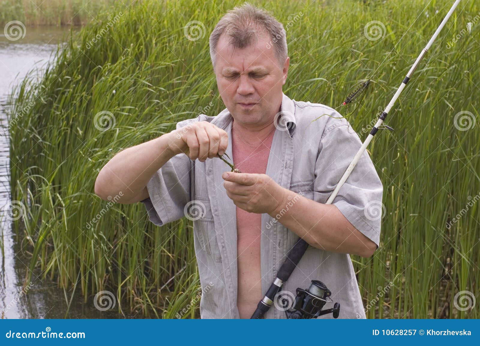 Fisherman with his catch stock image. Image of lake, rest - 10628257