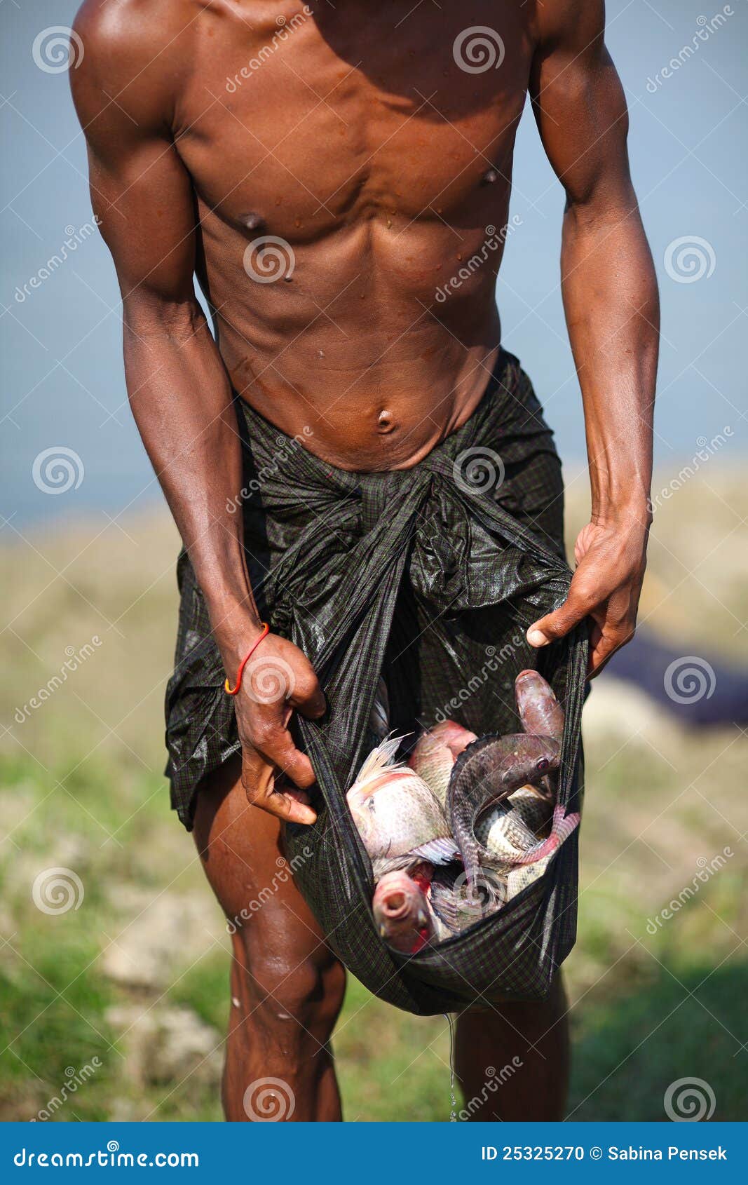 Fisherman with His Catch in Longyi, Myanmar Stock Photo - Image of ...