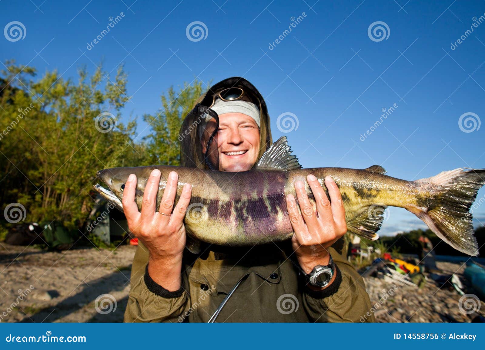 Fisherman Holding a Fresh Caught Fish Stock Photo - Image of action ...
