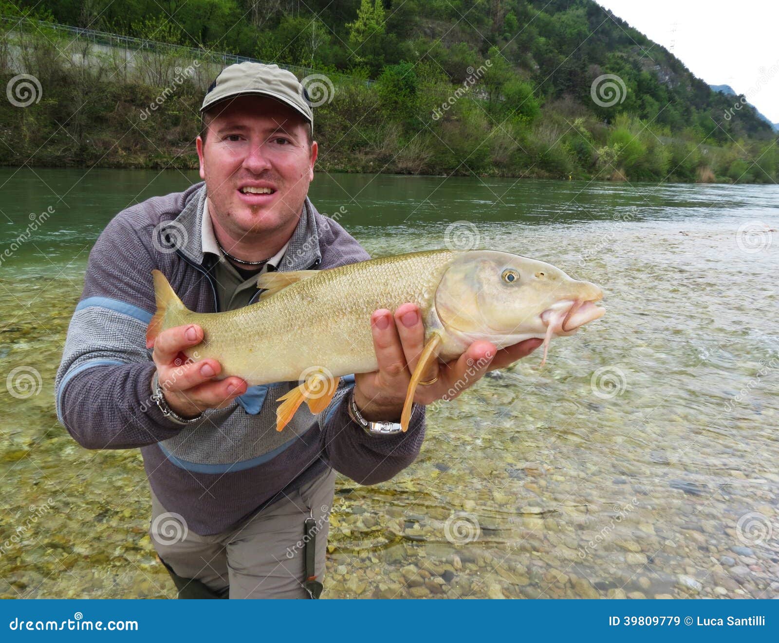 Fisherman Holding a Fresh Caught Fish Stock Image - Image of holiday ...