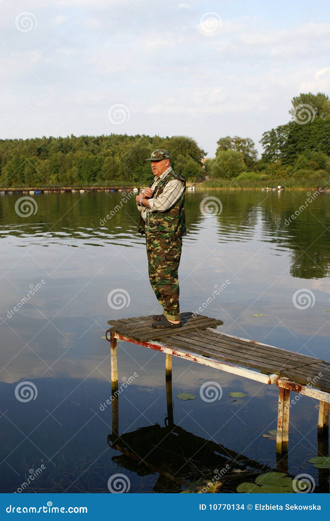 Fisherman looking for fish stock photo. Image of aged - 10770134
