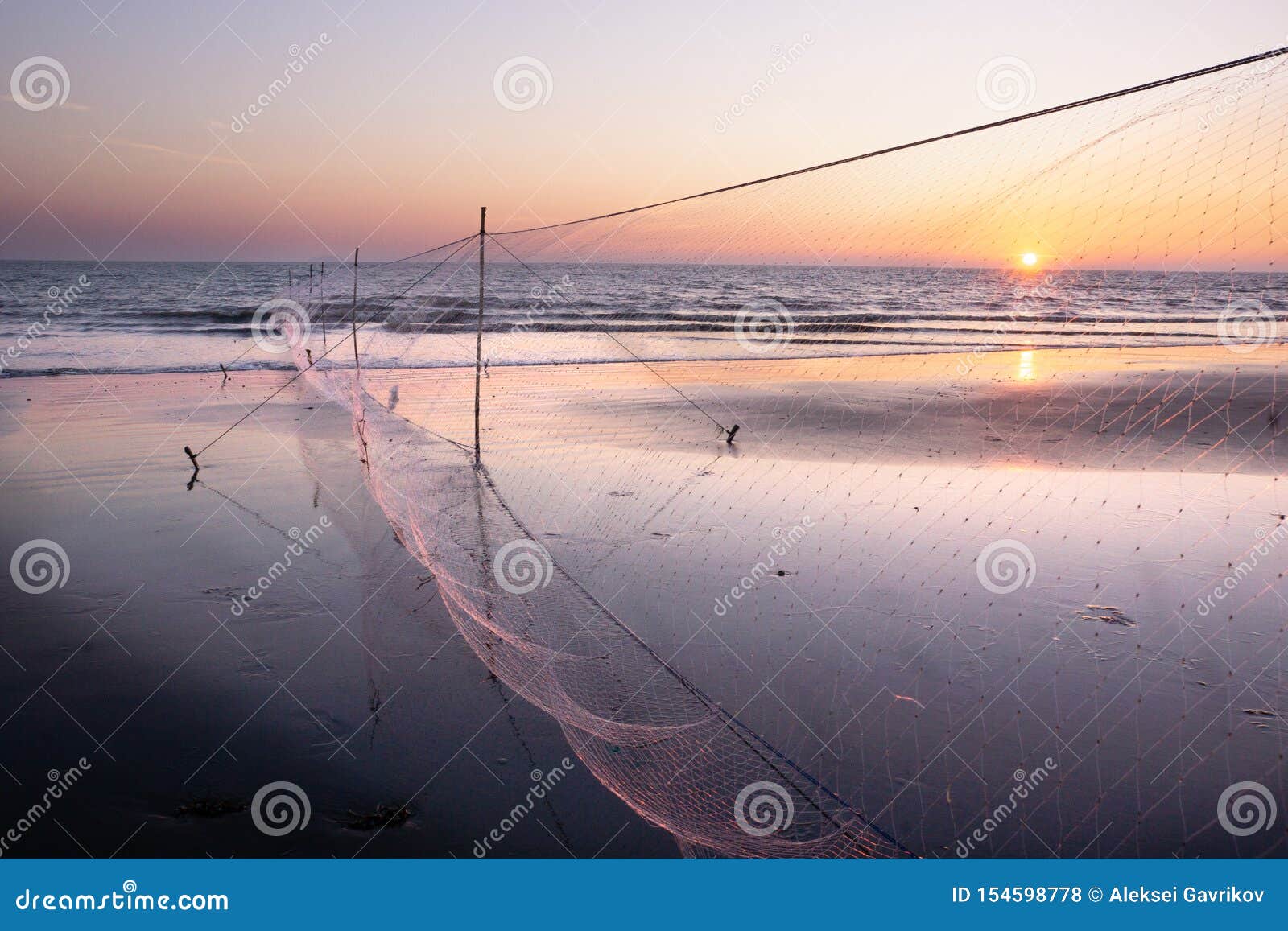 The Fishermans Net and Sunset Stock Photo - Image of line, nature ...
