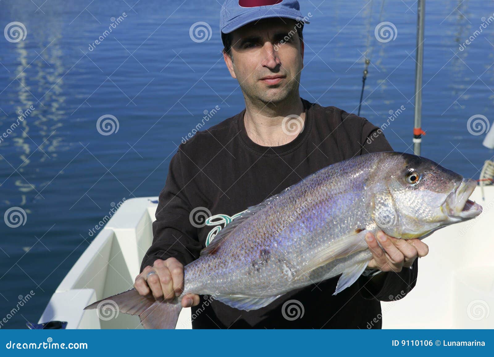 Fisherman Showing Proud Catch Saltwater Fish Stock Photo - Image of ...