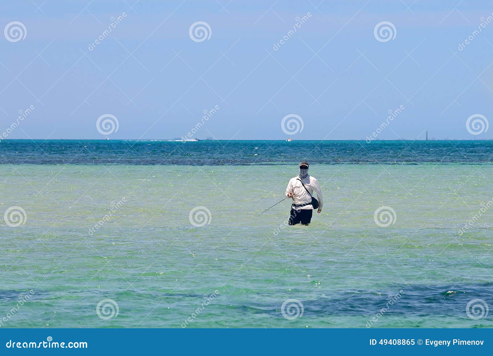 Fisherman Standing in the Sea Stock Image - Image of summer, equipment ...