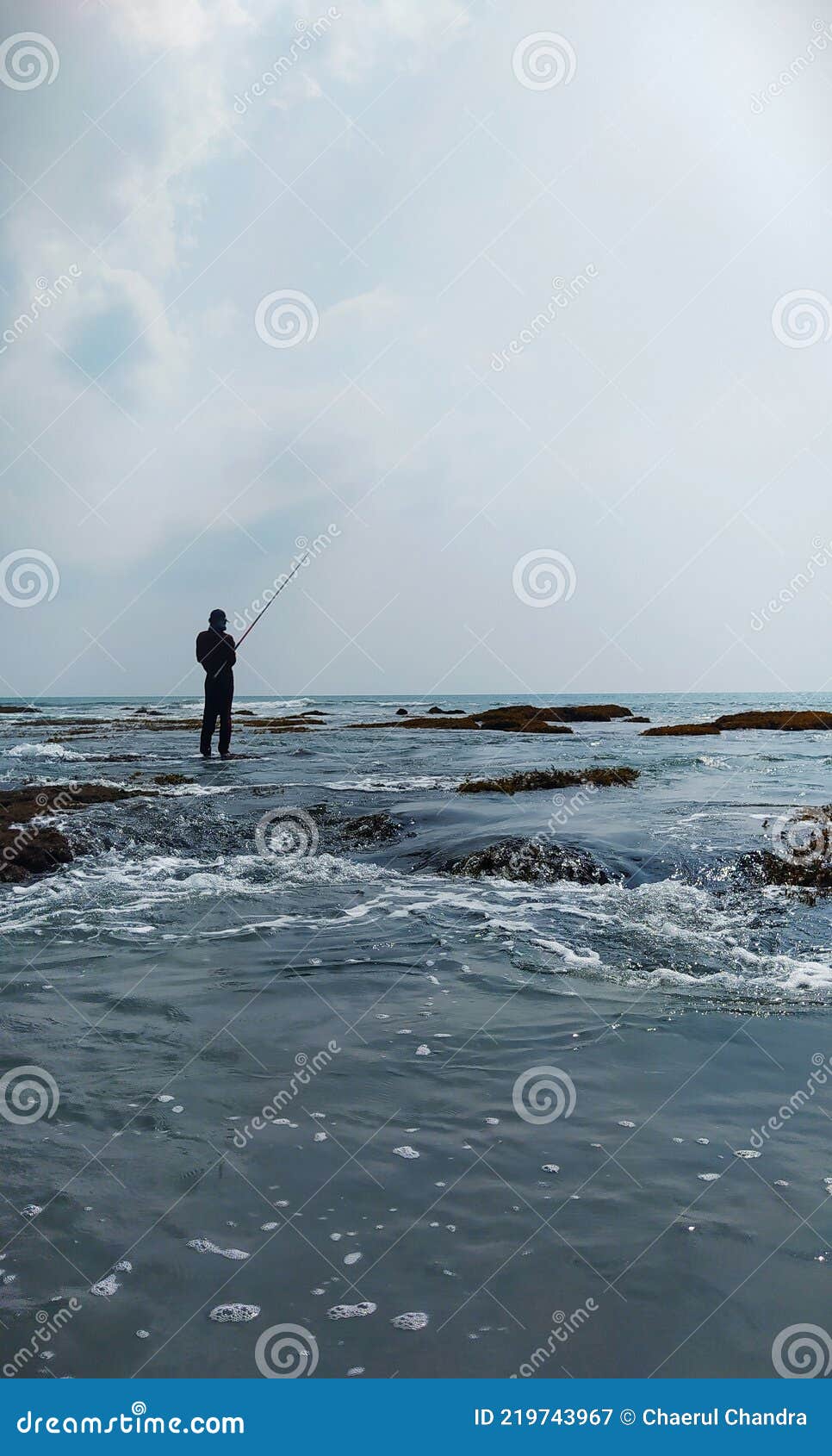 Fisherman Still Waiting for a Fish Stock Image - Image of still, beach ...