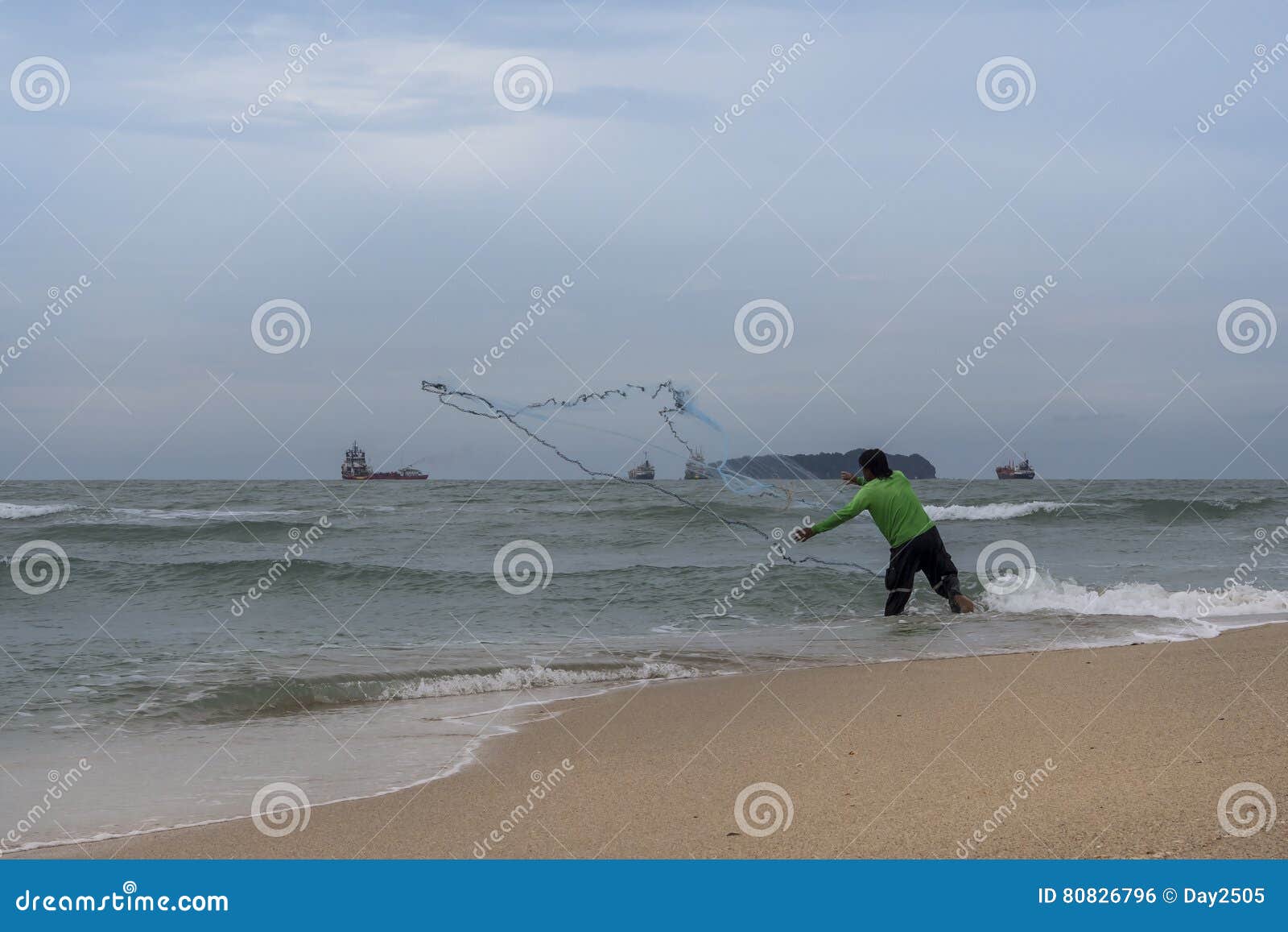Fisherman Throwing Out A Net At Struisbaai Harbour Editorial Photo ...
