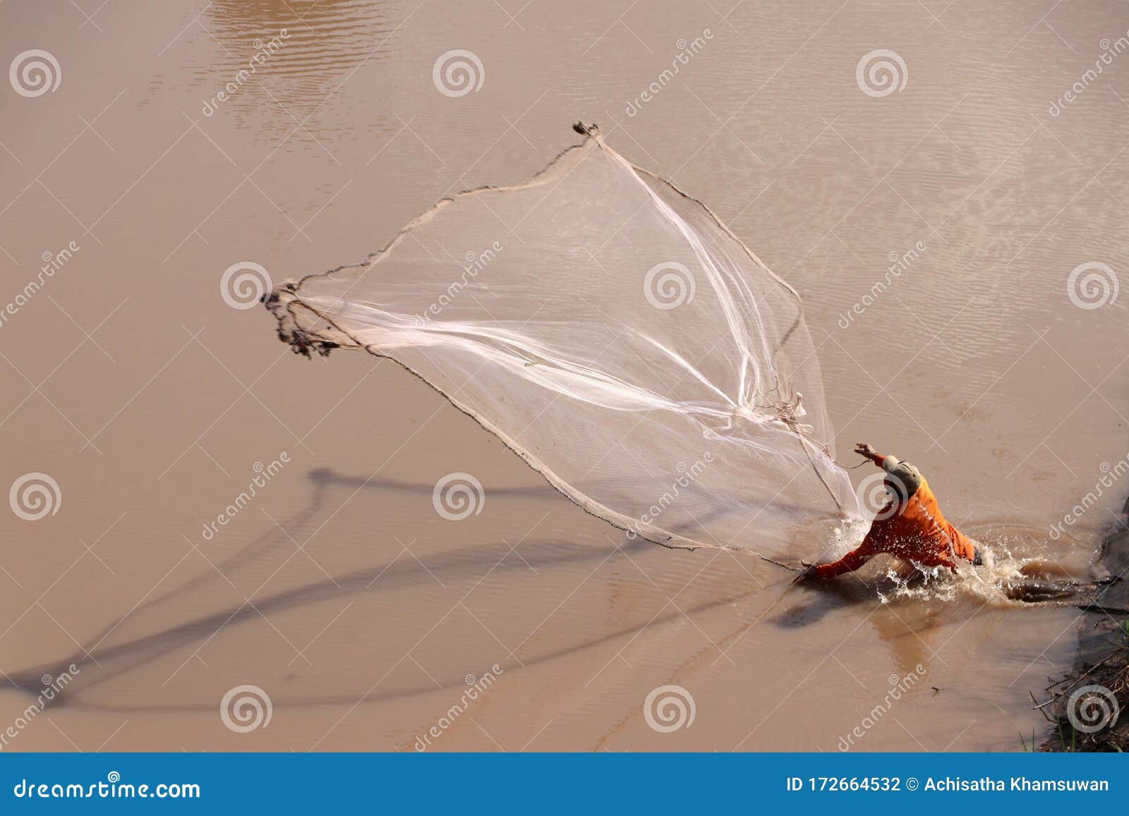 A Fisherman Throwing a Net into the River Editorial Photography - Image ...