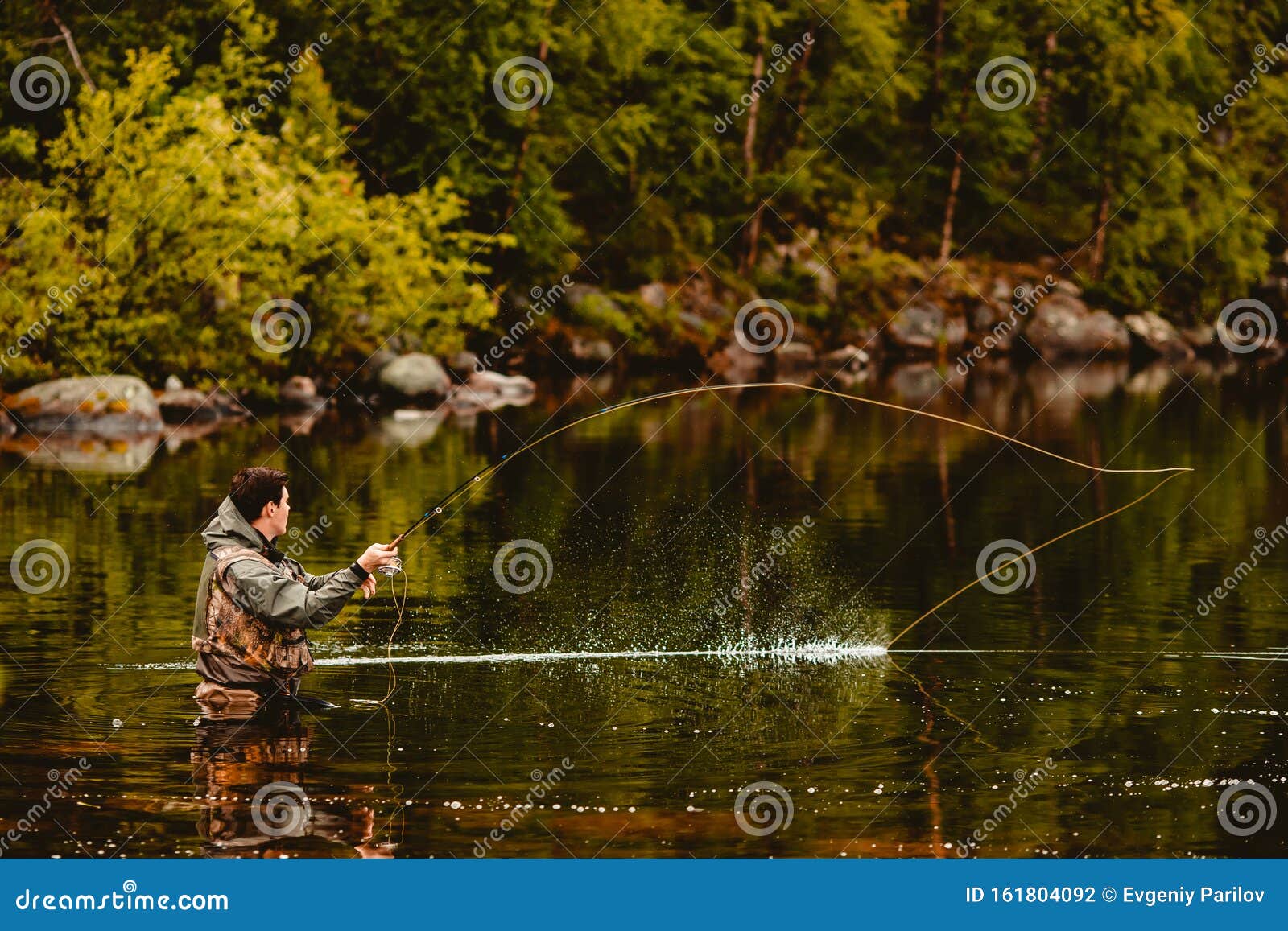 Fisherman Using Rod Fly Fishing in Mountain River Stock Photo - Image ...