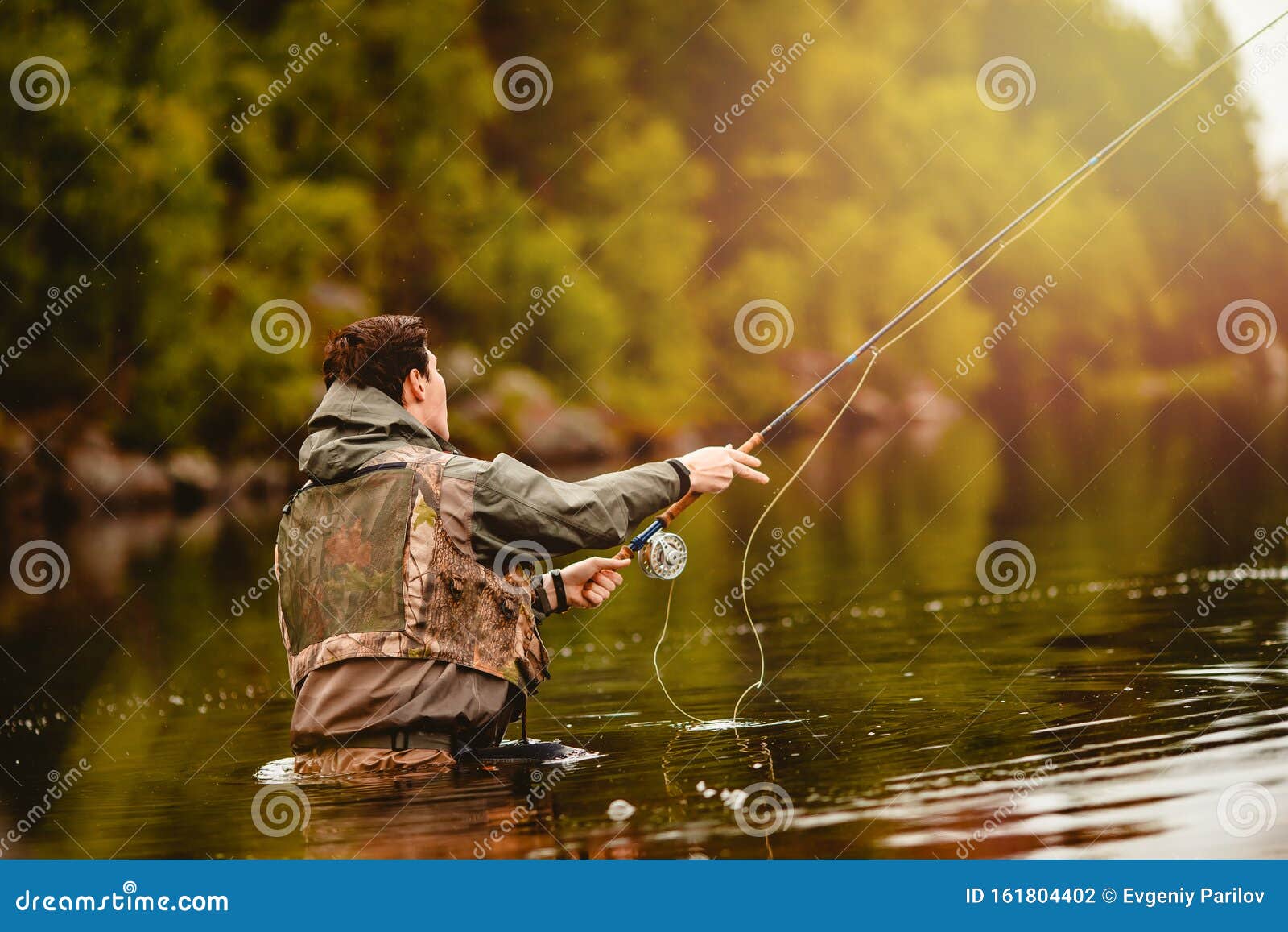 Fisherman Using Rod Fly Fishing in Mountain River Stock Photo - Image ...