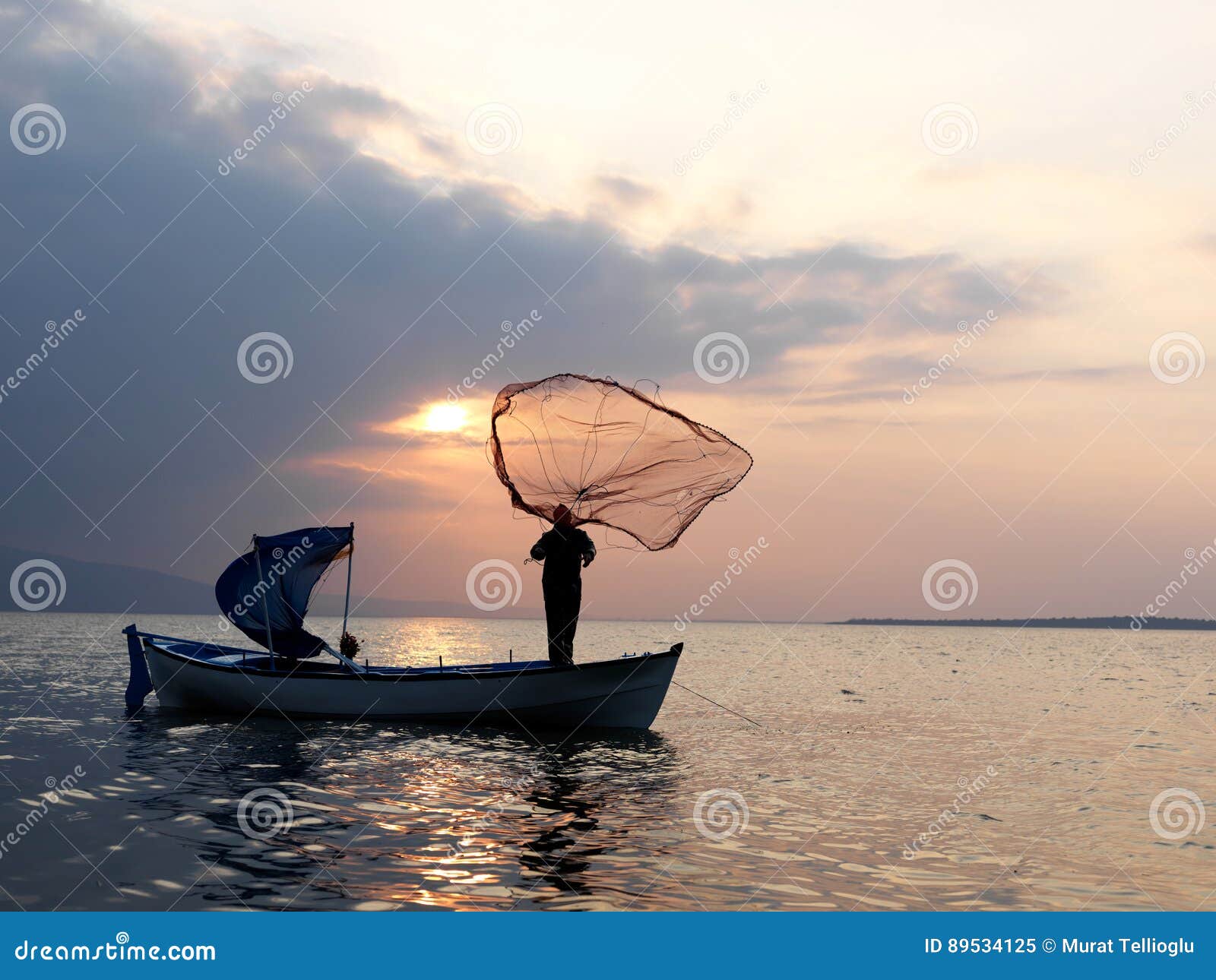 Fishermans Throwing Net To Sea on Sunset Stock Image - Image of ...