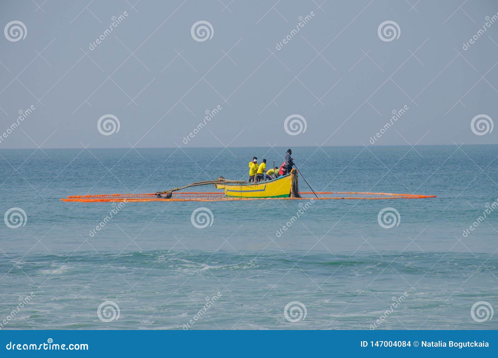 Fishermen by the Boat Catch Fish in the Sea Editorial Stock Image ...