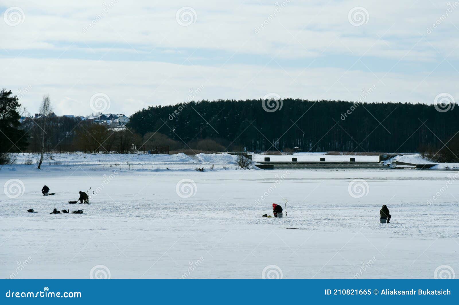 Fishermen Catch Fish on a Frozen Lake in Winter. Stock Image - Image of ...