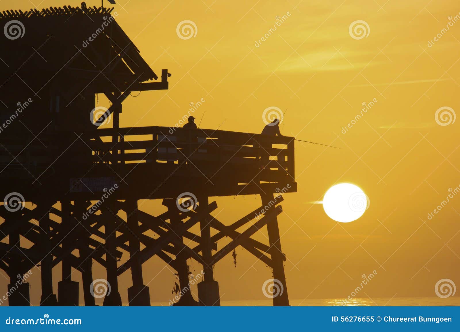 Fishermen catching the sun stock image. Image of sunset - 56276655