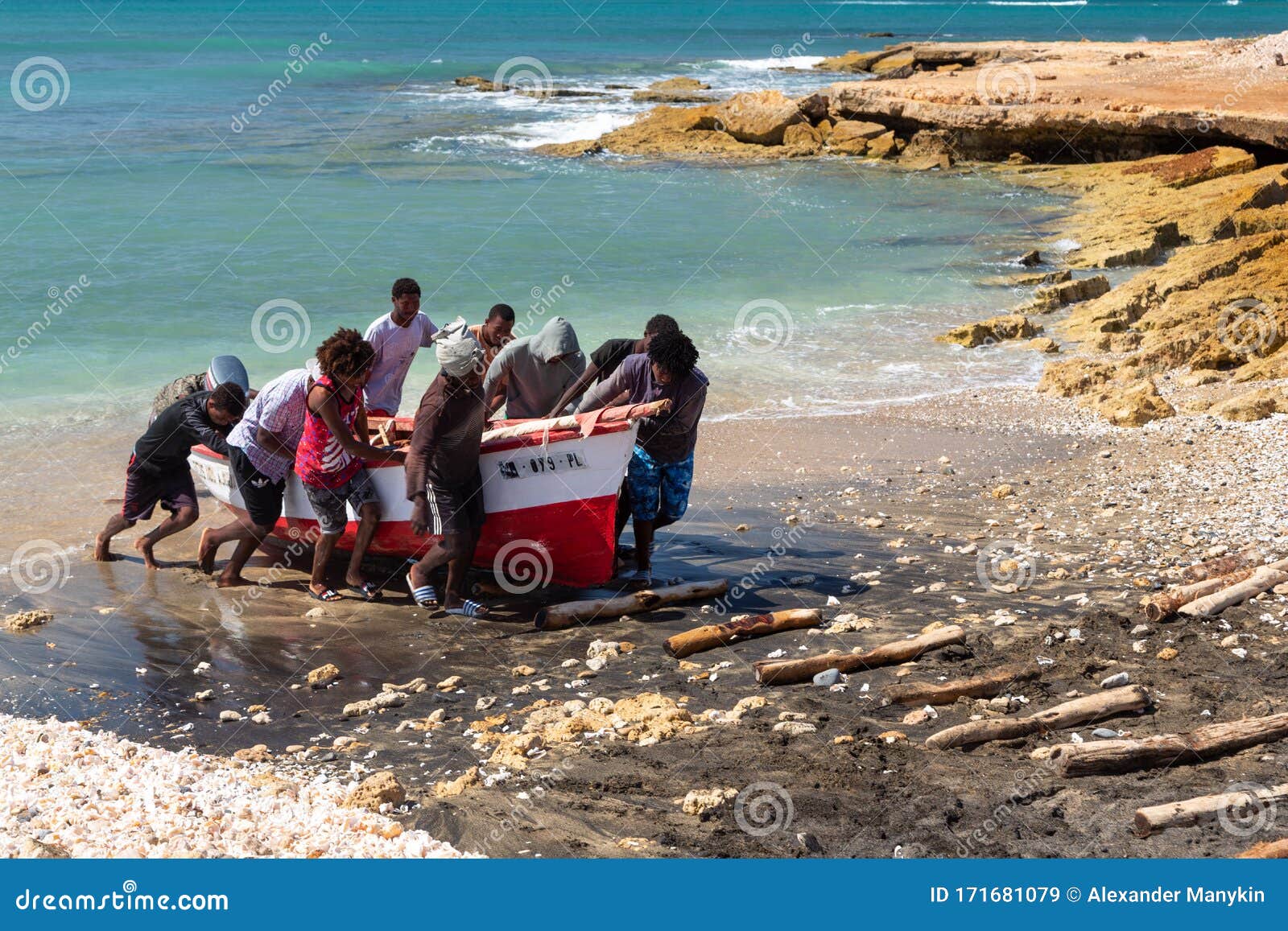Fishermen Pulling a Boat Ashore Editorial Stock Image - Image of laying ...