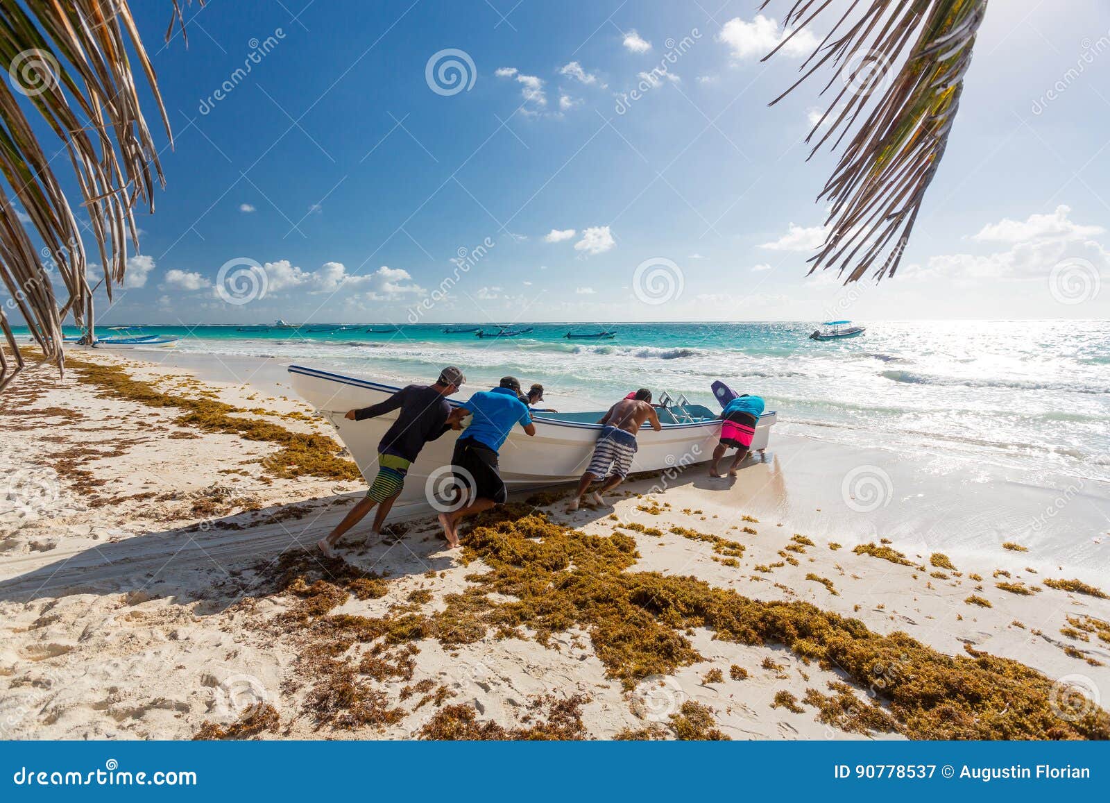 Fishermen Pushing a Bot on a Beach Editorial Photography - Image of ...