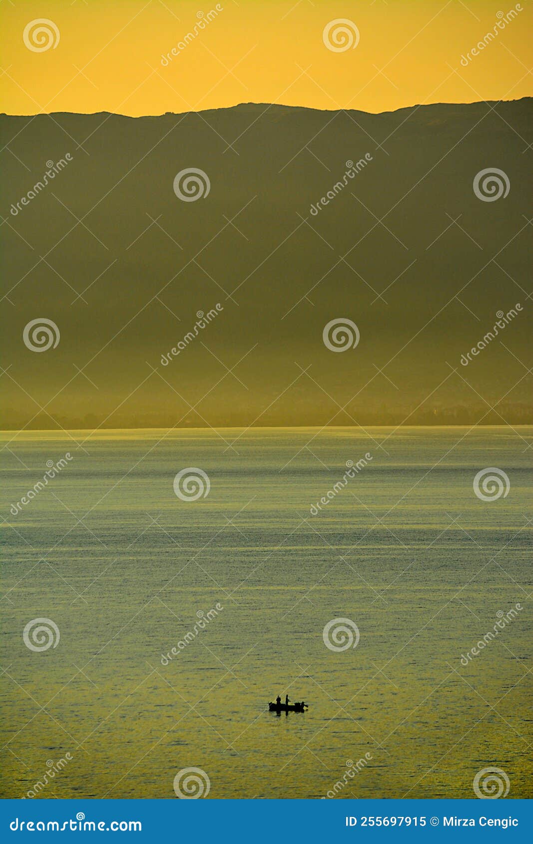 Fisherman Catch Fish in Little Boat at Sunrise with Mountain and Sky ...
