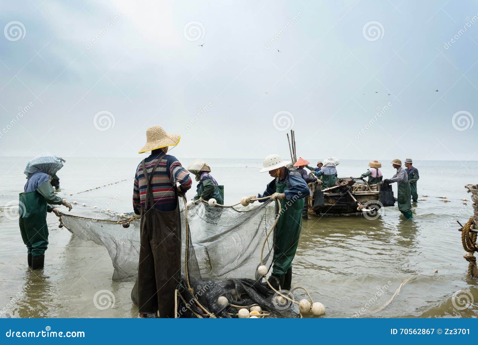 Fishermen team working editorial photography. Image of lifestyle - 70562867