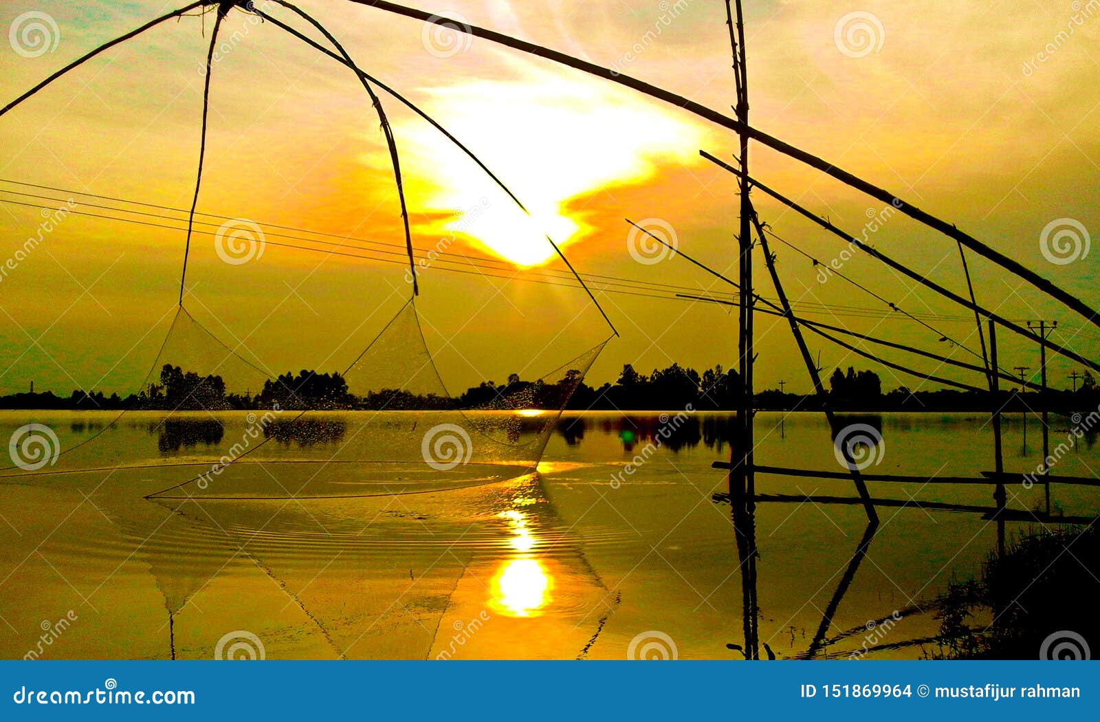 A Fishermen Waiting for the Hold Fish in the River Stock Photo - Image ...