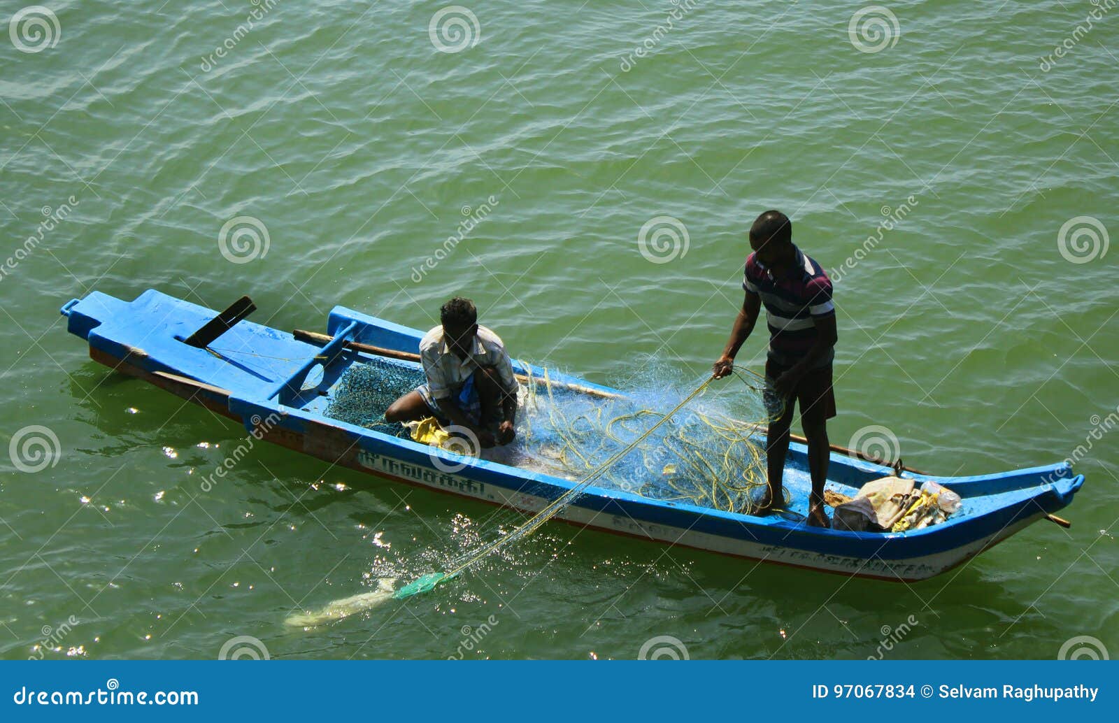 Fishermen at work editorial stock image. Image of beach - 97067834
