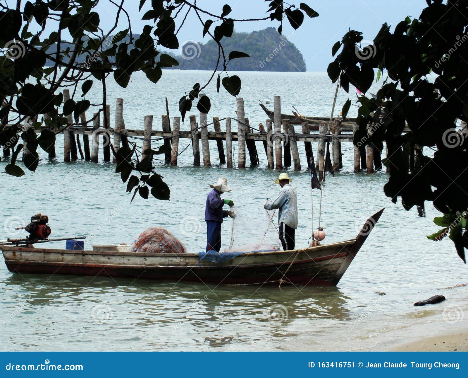 Fishermen at Work on a Small Pirogue in the Island of Langkawi ...