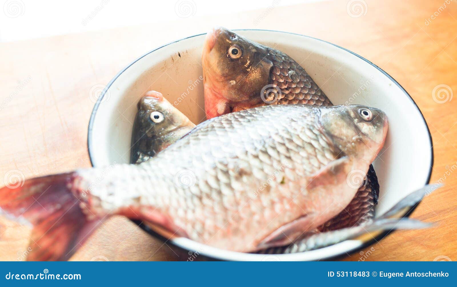 Fishes in the Dish or Bowl on the Table in the Kitchen Stock Image ...
