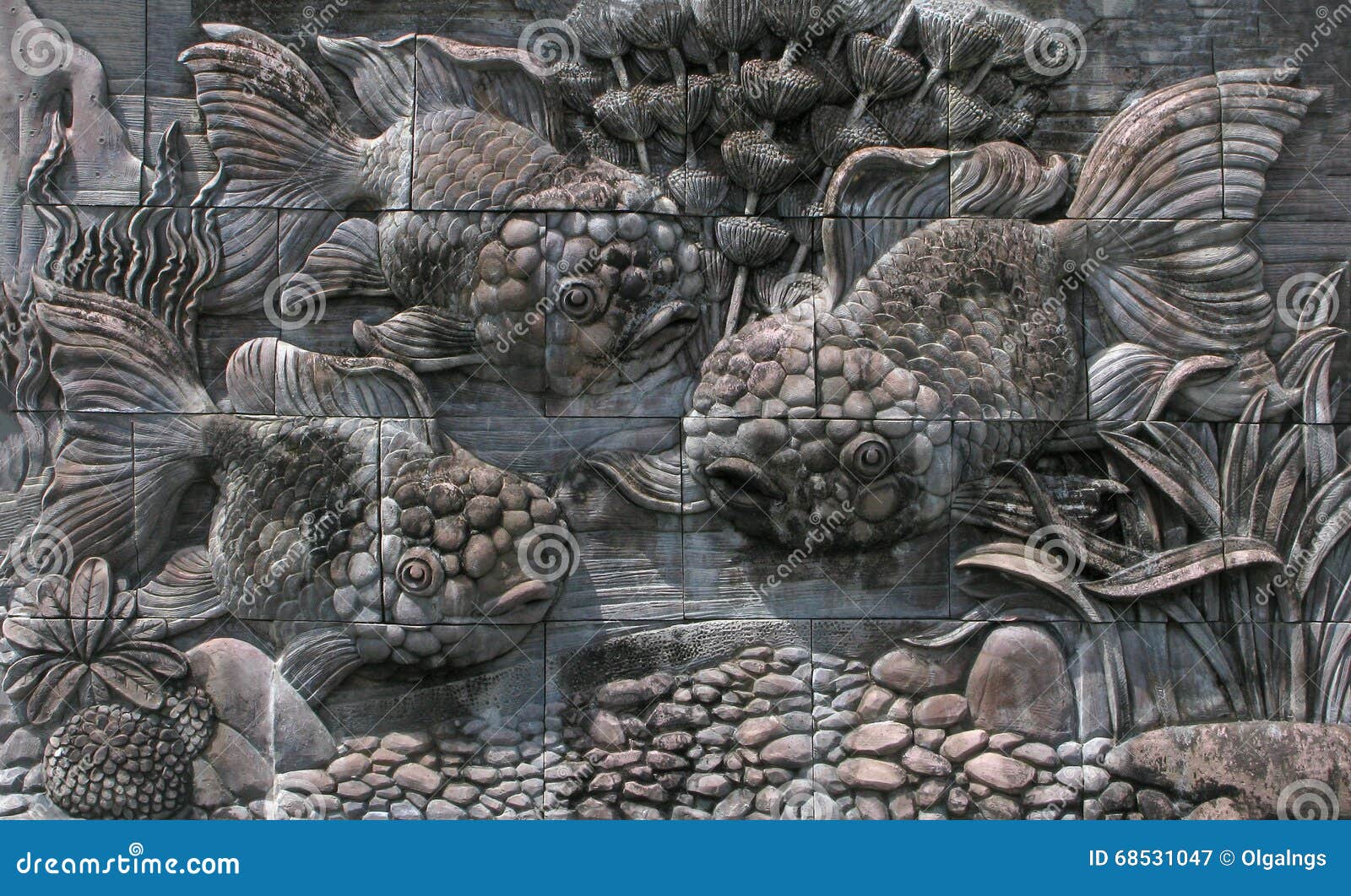 Fishes from stone stock image. Image of fishes, ancient - 68531047