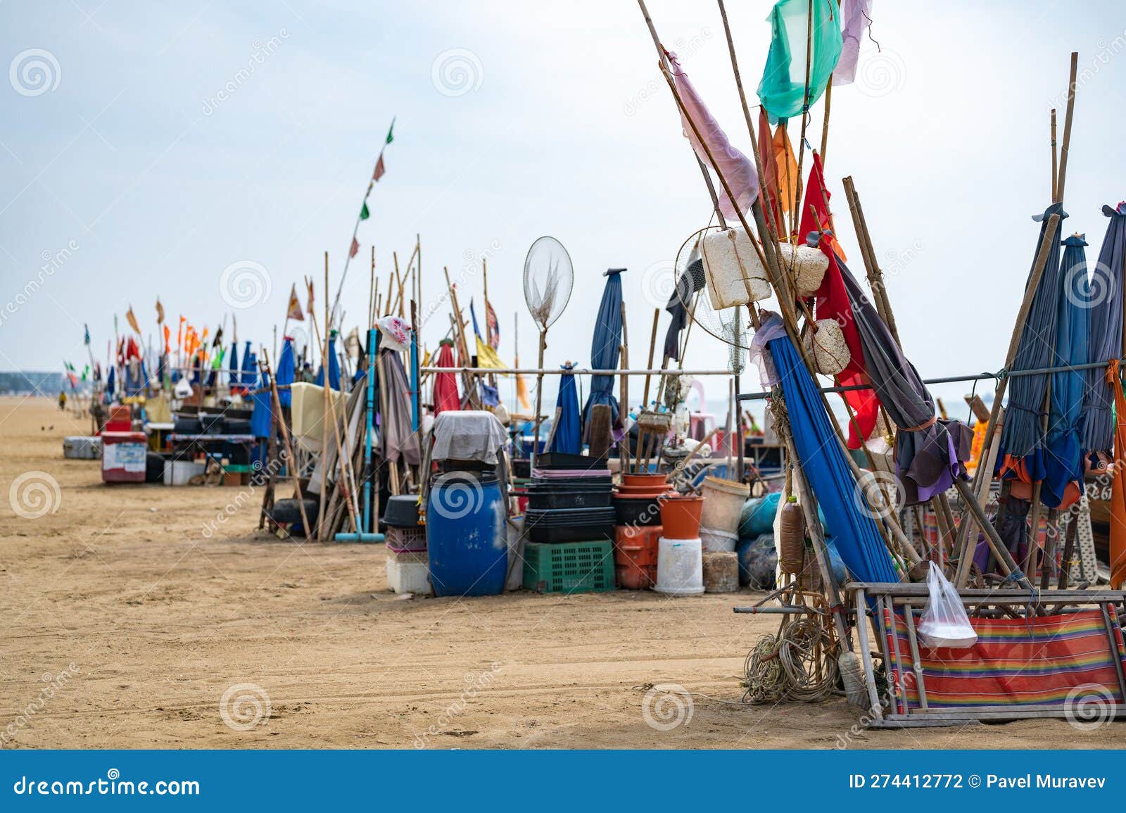 Fishing Accessories, Tools and Nets. Fishing Nets Collected on Sand ...