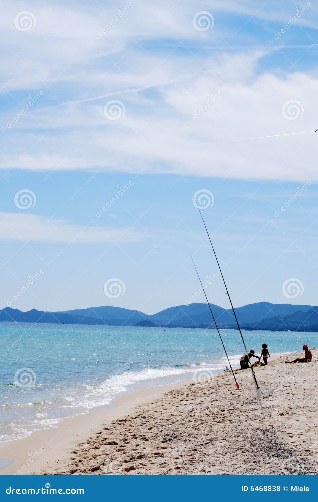 Fishing on the beach stock photo. Image of colorful, person - 6468838