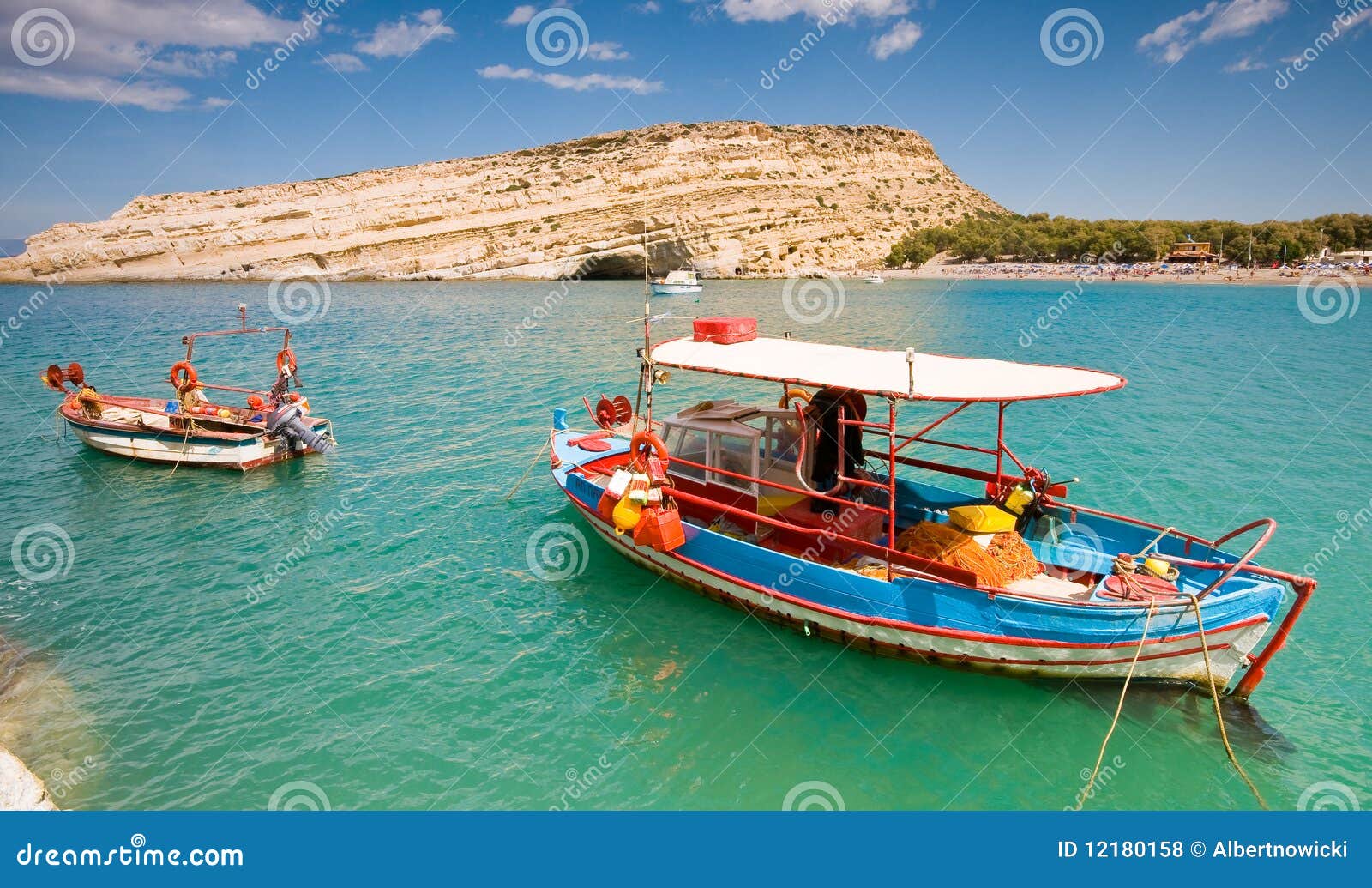 Fishing Boat Anchored in Matala Bay, Crete Stock Photo - Image of cave ...
