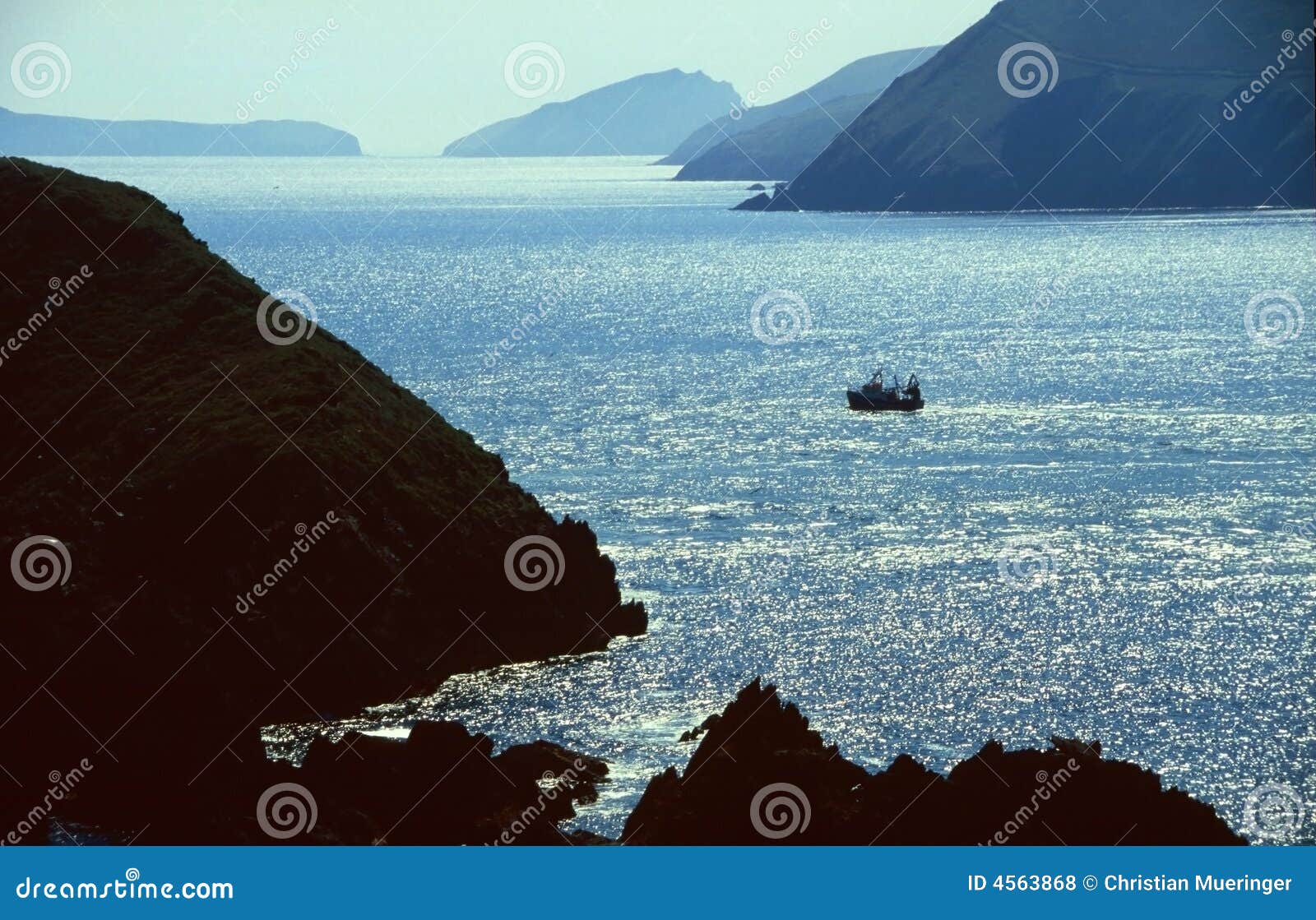 Fishing boat in Dingle Bay stock photo. Image of fishing - 4563868