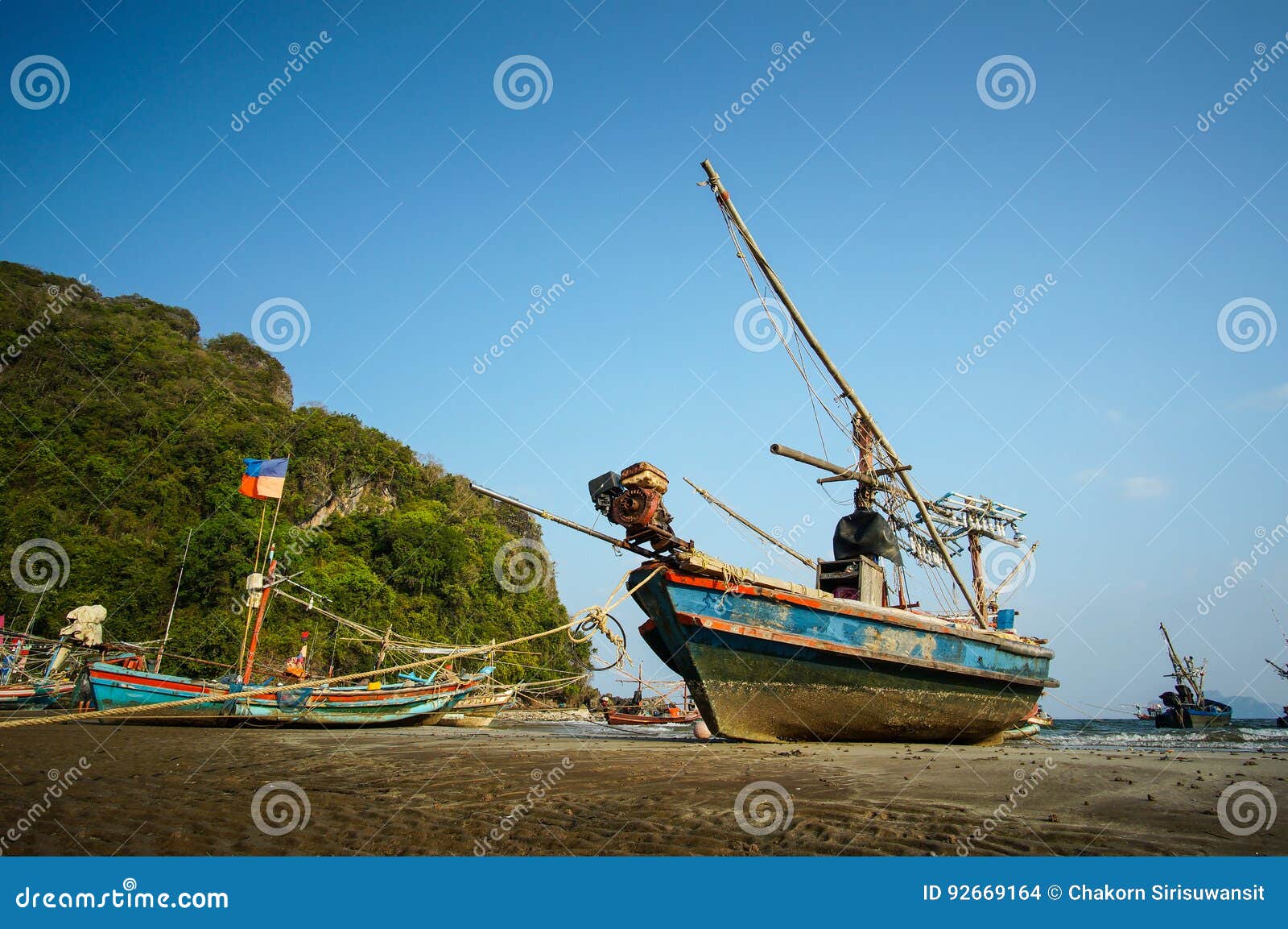 Fishing Boat Docking on the Beach Stock Photo - Image of beach, water ...