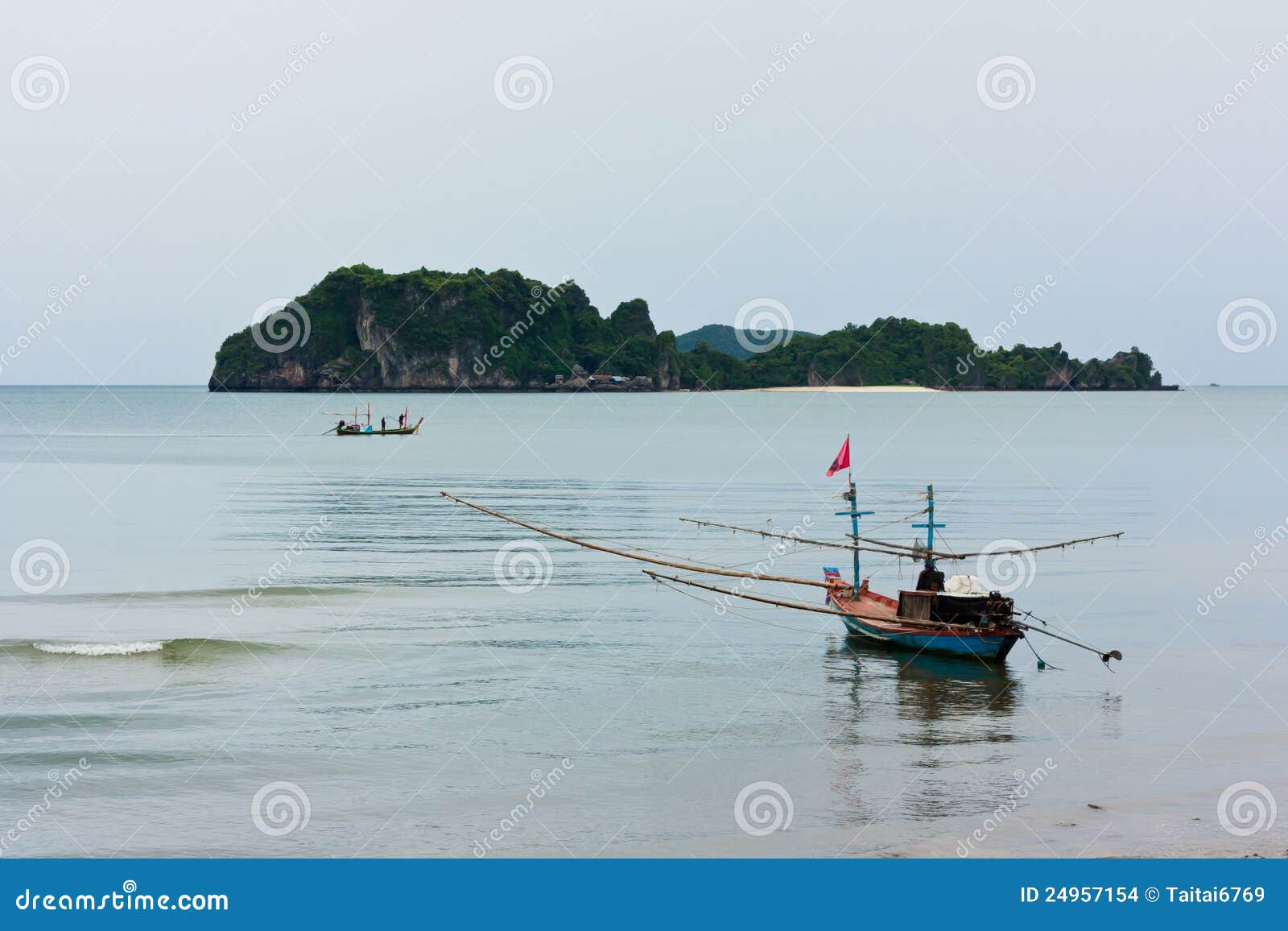 Fishing boat and Island stock photo. Image of island - 24957154